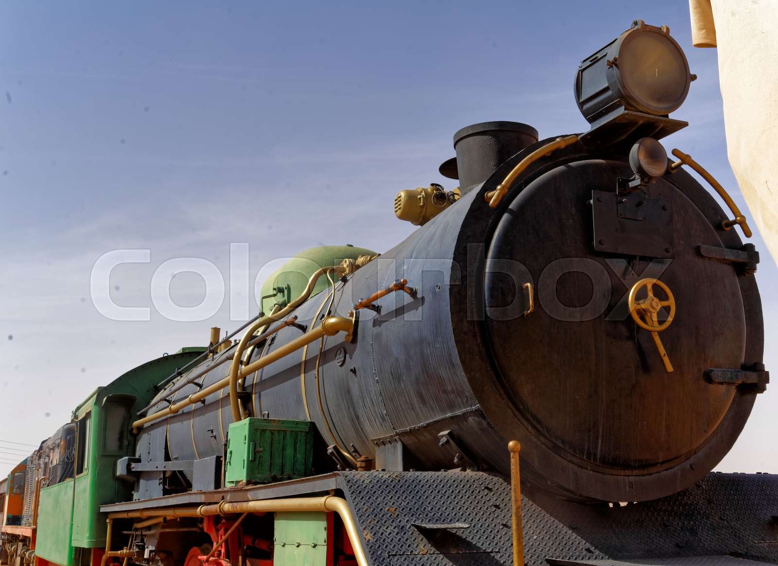 The ancient steam locomotive, still in use, in the desert of Wadi Rum ...