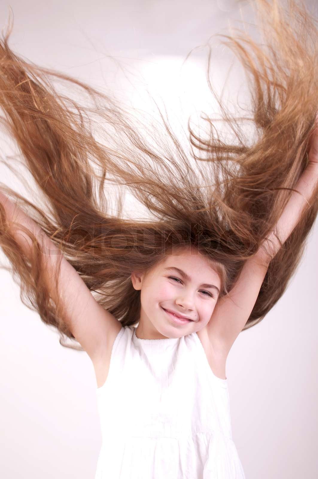 beautiful happy smiling girl with long hair | Stock image | Colourbox
