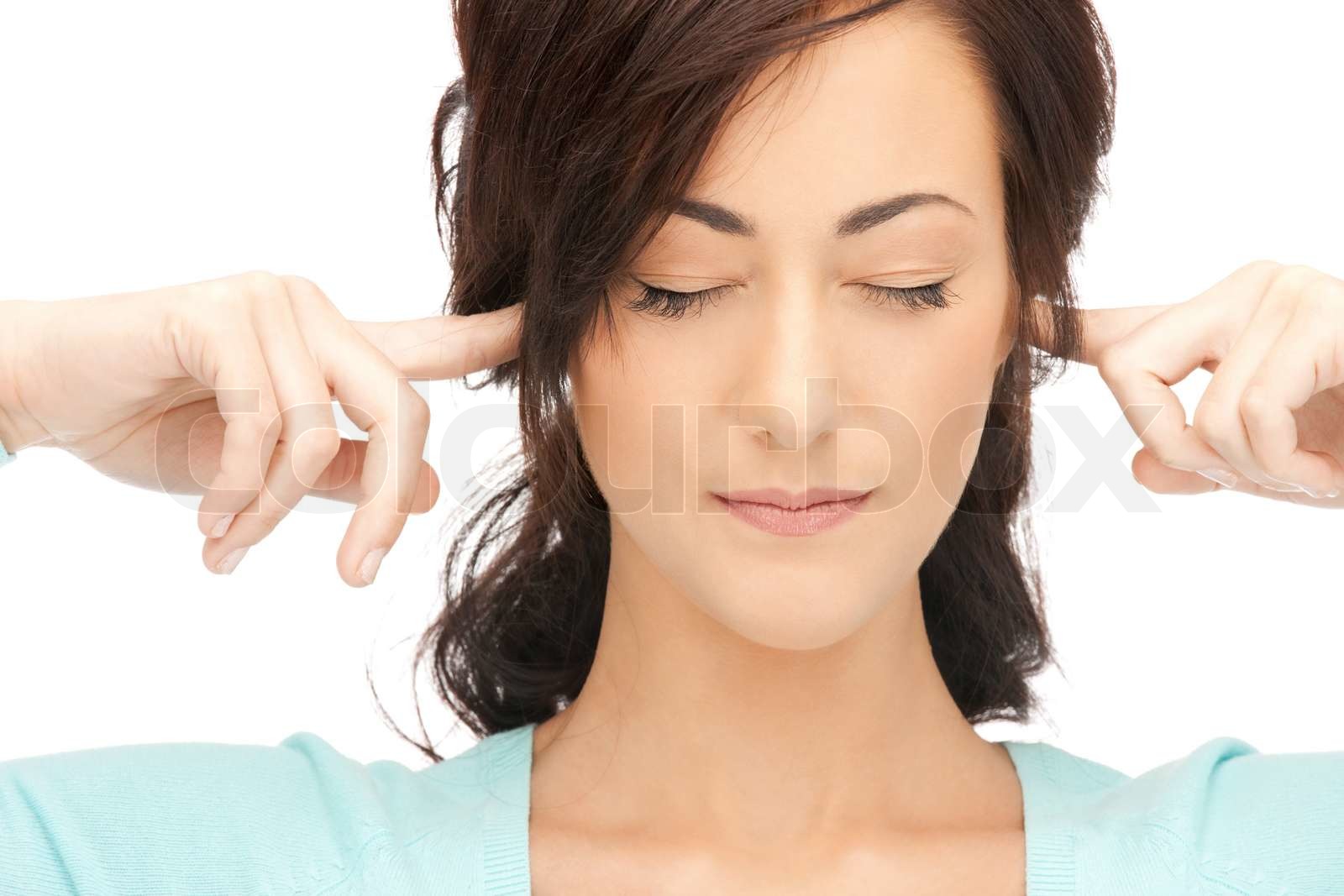 picture of woman with fingers in ears | Stock image | Colourbox