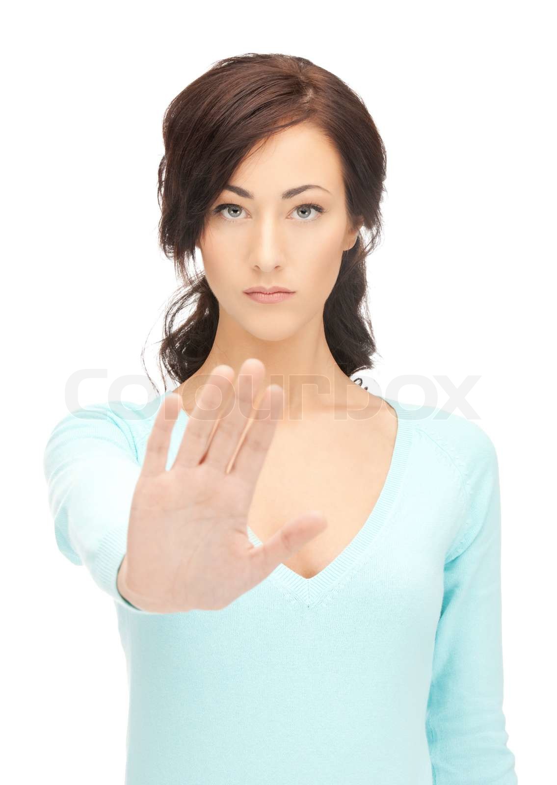 bright picture of young woman making stop gesture | Stock image | Colourbox