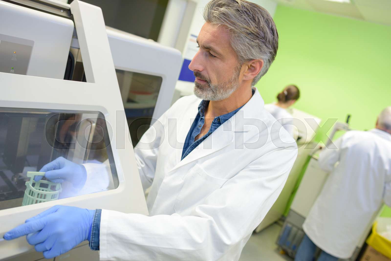 laboratory personnel working | Stock image | Colourbox