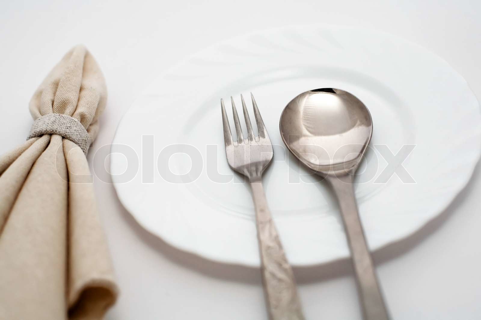 An image of fork, spoon and napkin | Stock image | Colourbox