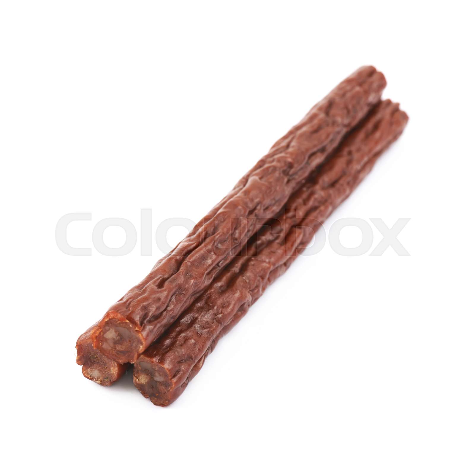 Cured stick of meat isolated | Stock image | Colourbox