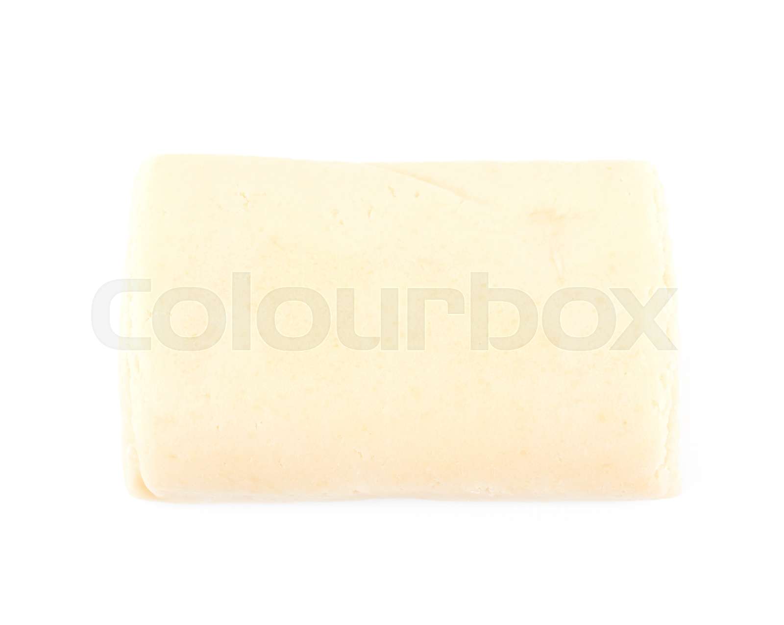Block of marzipan isolated | Stock image | Colourbox