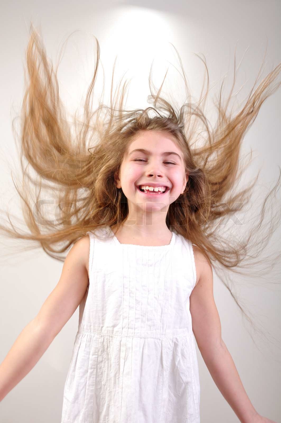 beautiful happy smiling girl with long moving hair | Stock image ...