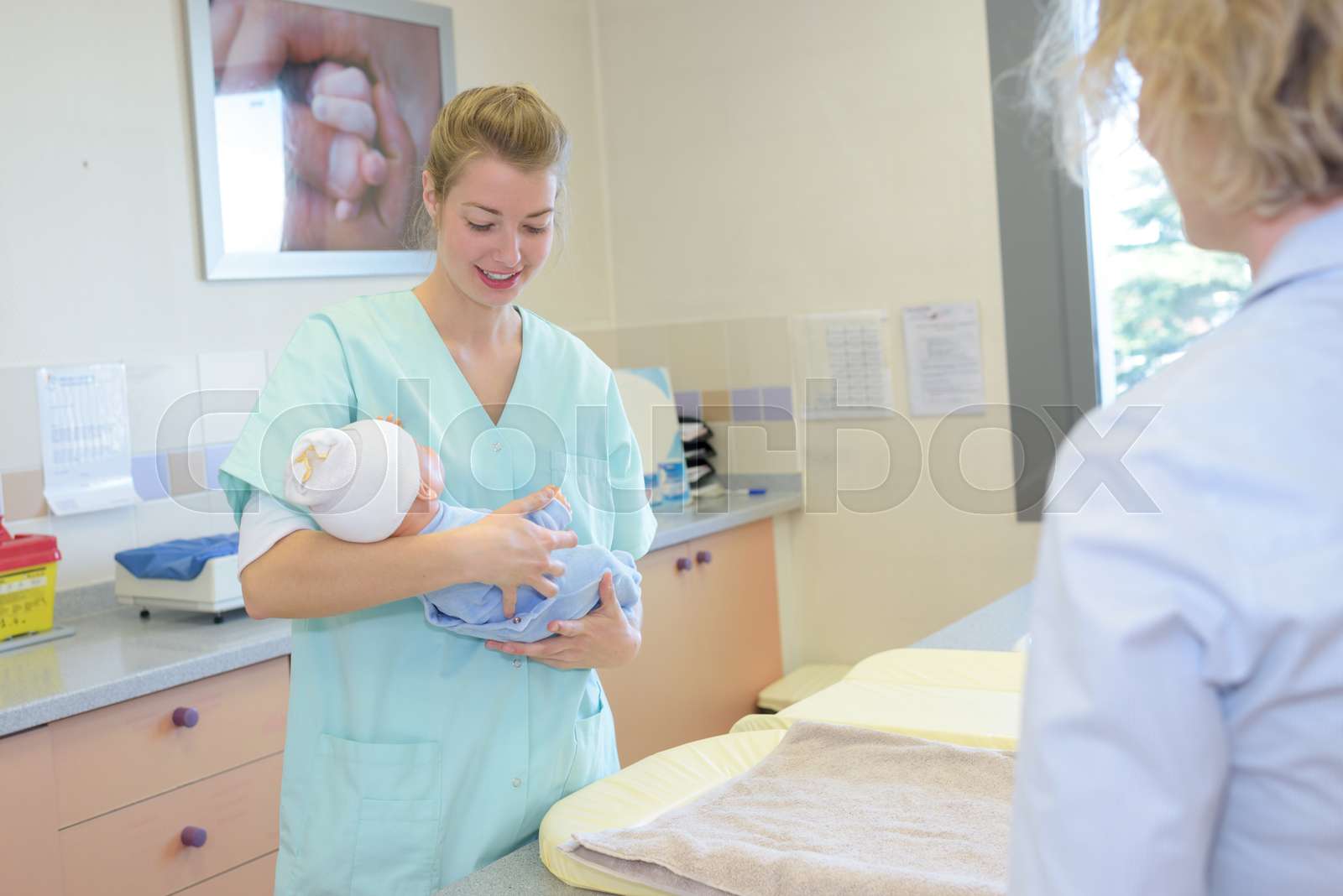 newborn baby in delivery room | Stock image | Colourbox