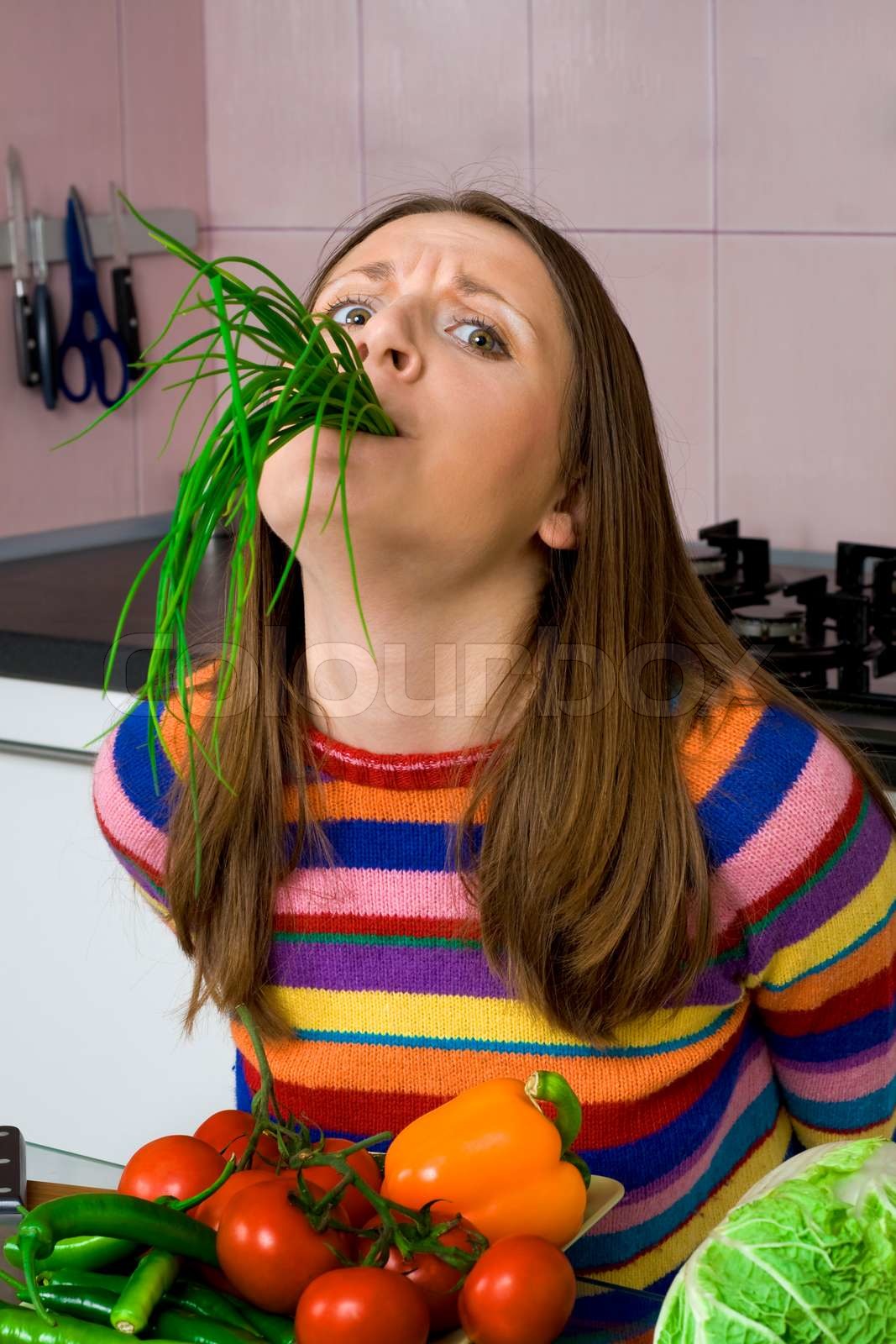 Woman fed up from vegetables | Stock image | Colourbox