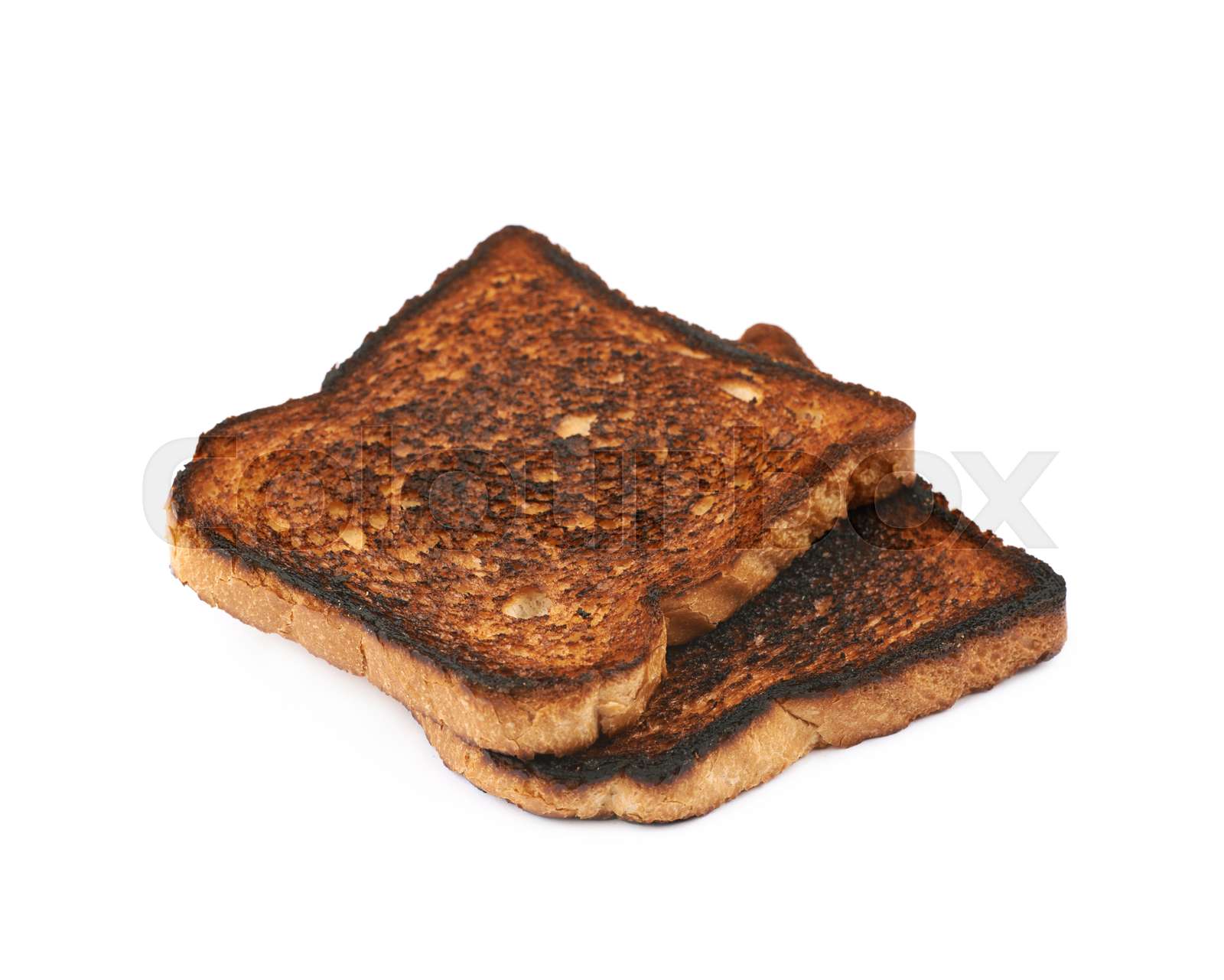 Over-toasted white bread isolated | Stock image | Colourbox