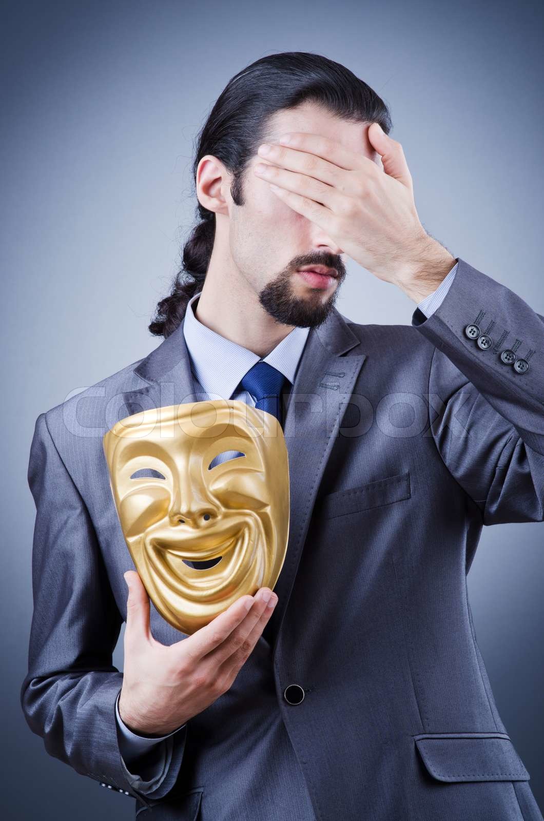 Businessman with mask concealing his identity | Stock image | Colourbox