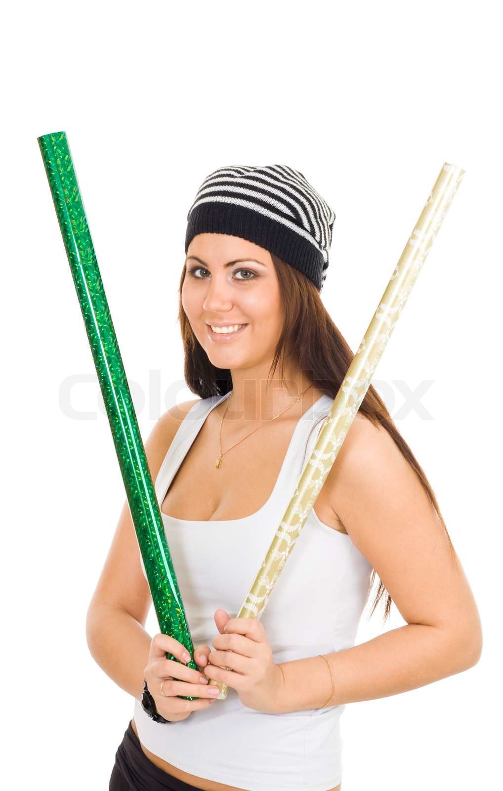 woman holding in hands goold and greend wrapping paper rols in V like ...