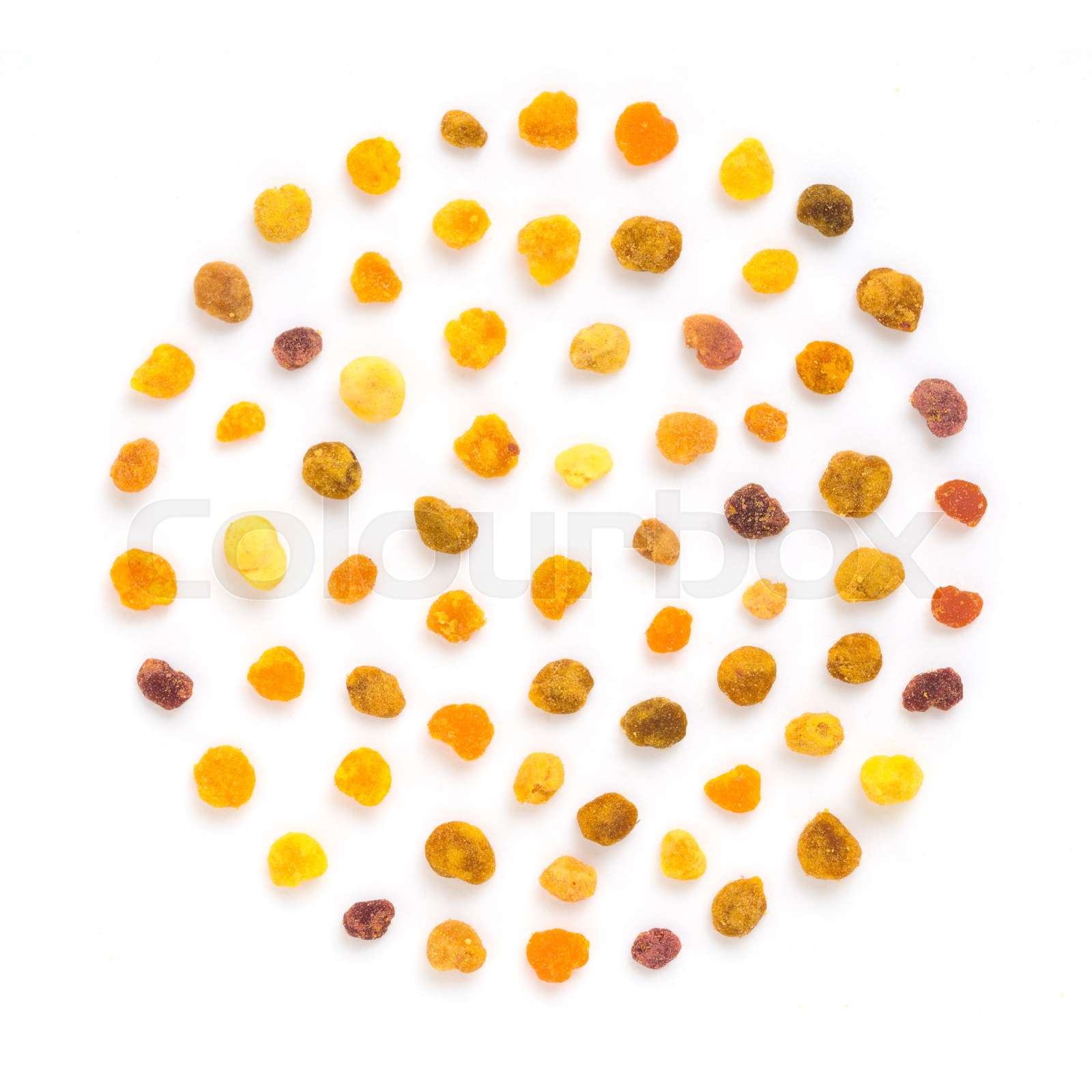 close up bee pollen round isolated white | Stock image | Colourbox