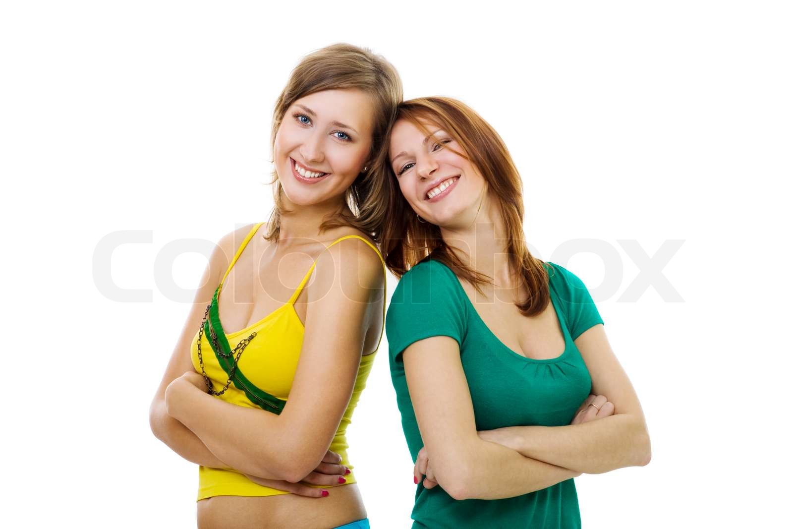 Two woman standin together lean on each other | Stock image | Colourbox