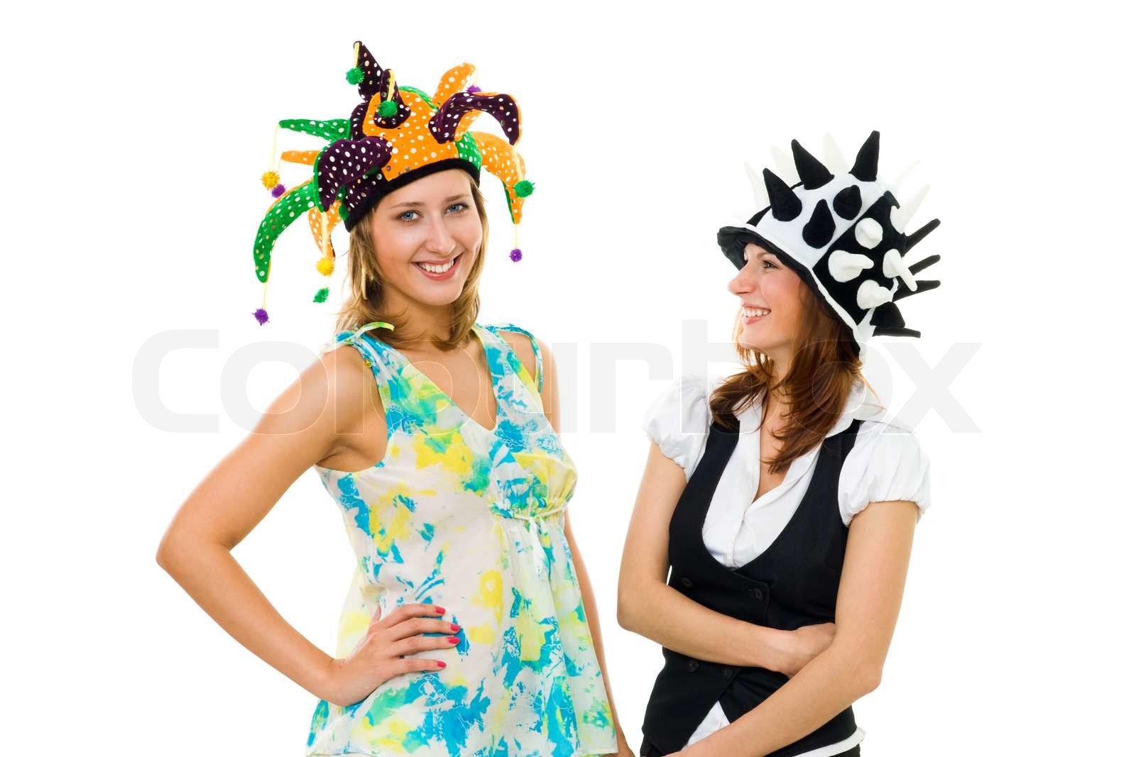 Two women actors standing wear the motley and smiling isolated on white ...