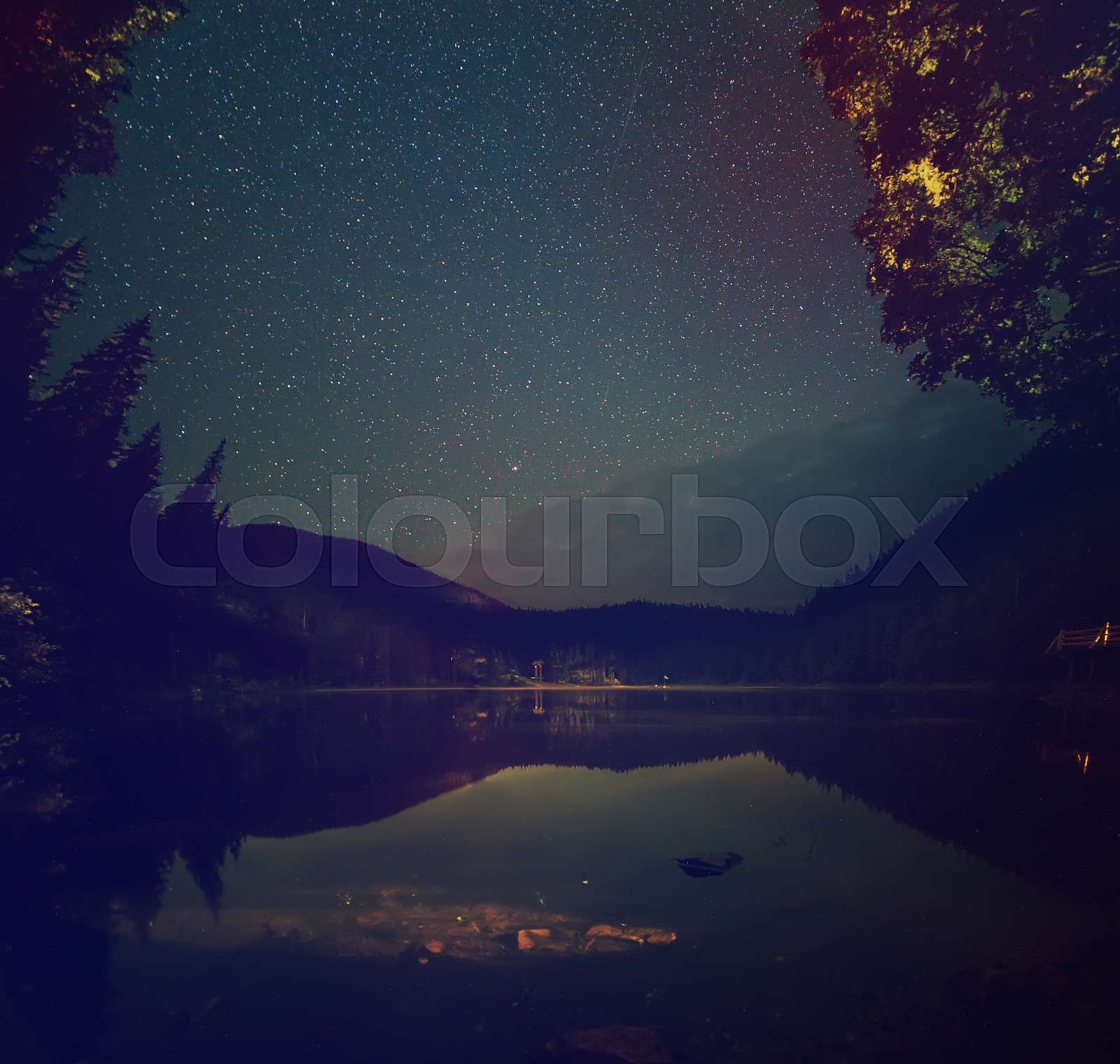 Mountain lake at night | Stock image | Colourbox