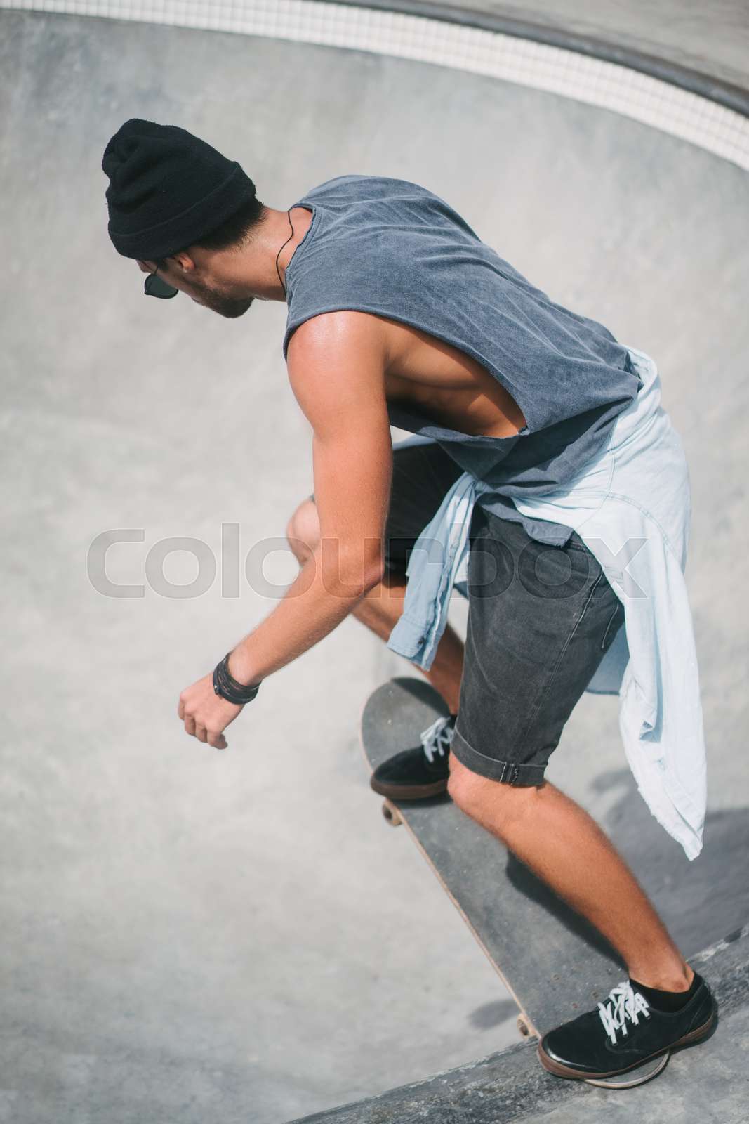 side view of sportive skater on longboard | Stock image | Colourbox