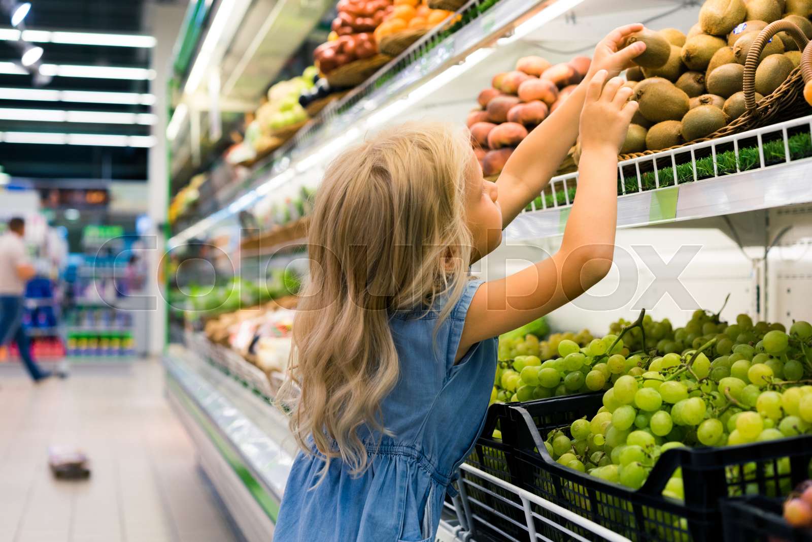 child choosing fruits | Stock image | Colourbox