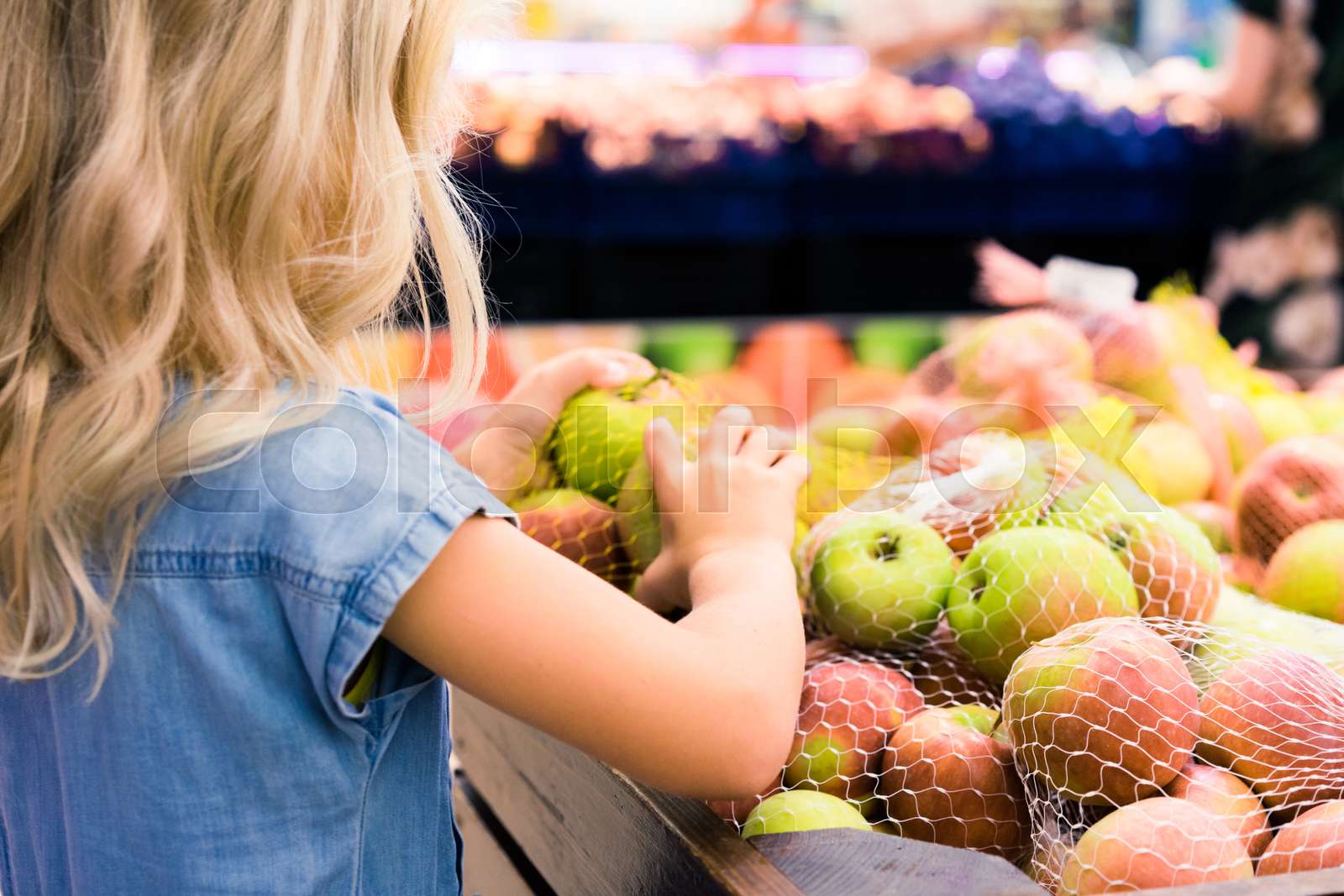 child choosing fruits | Stock image | Colourbox