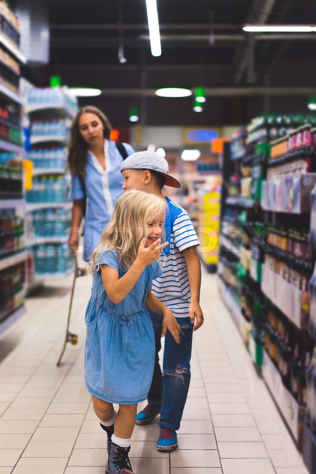 children having fun in supermarket | Stock image | Colourbox