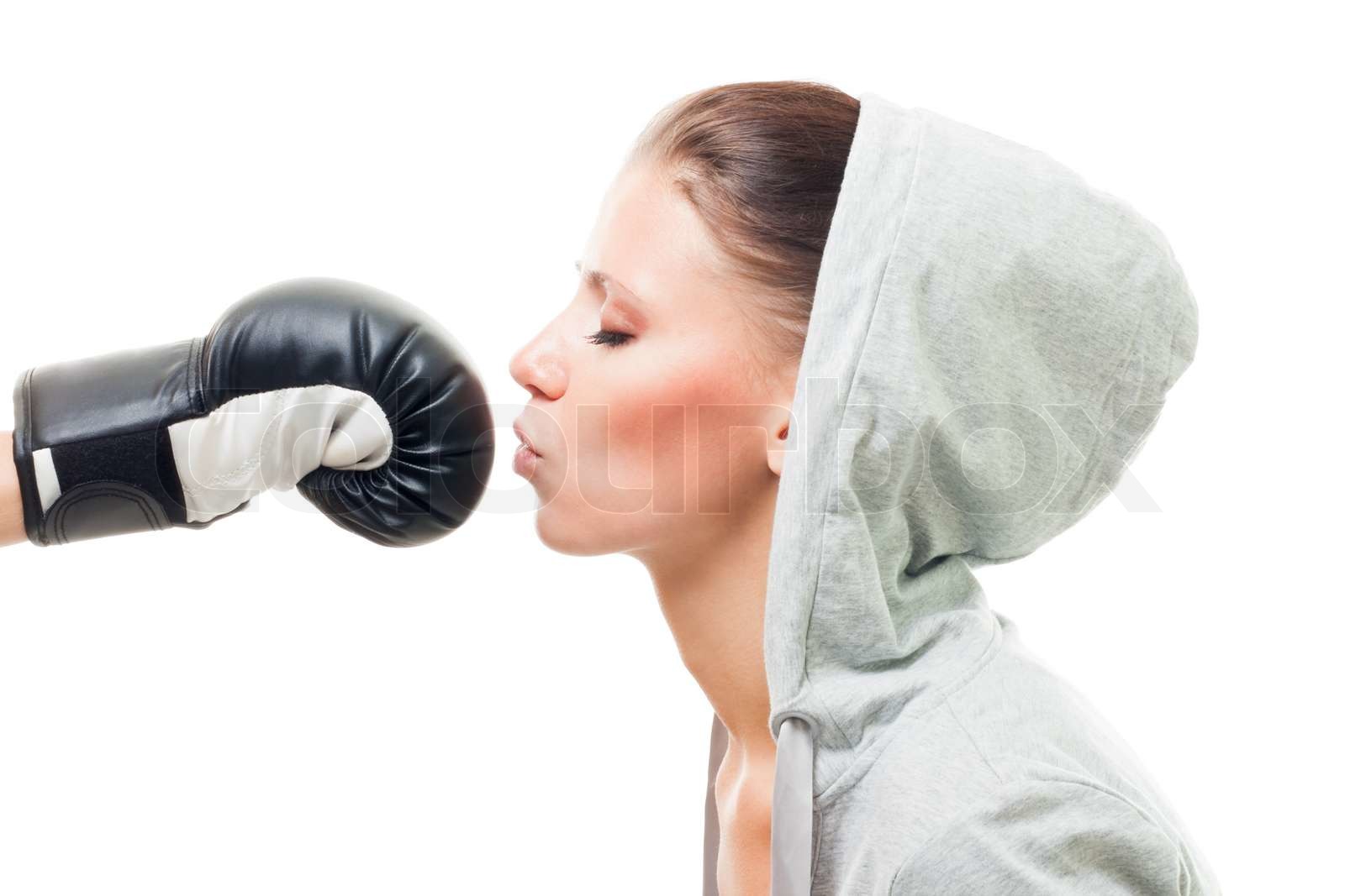 Beautiful woman kiss boxing glove representing love to fights and sport ...