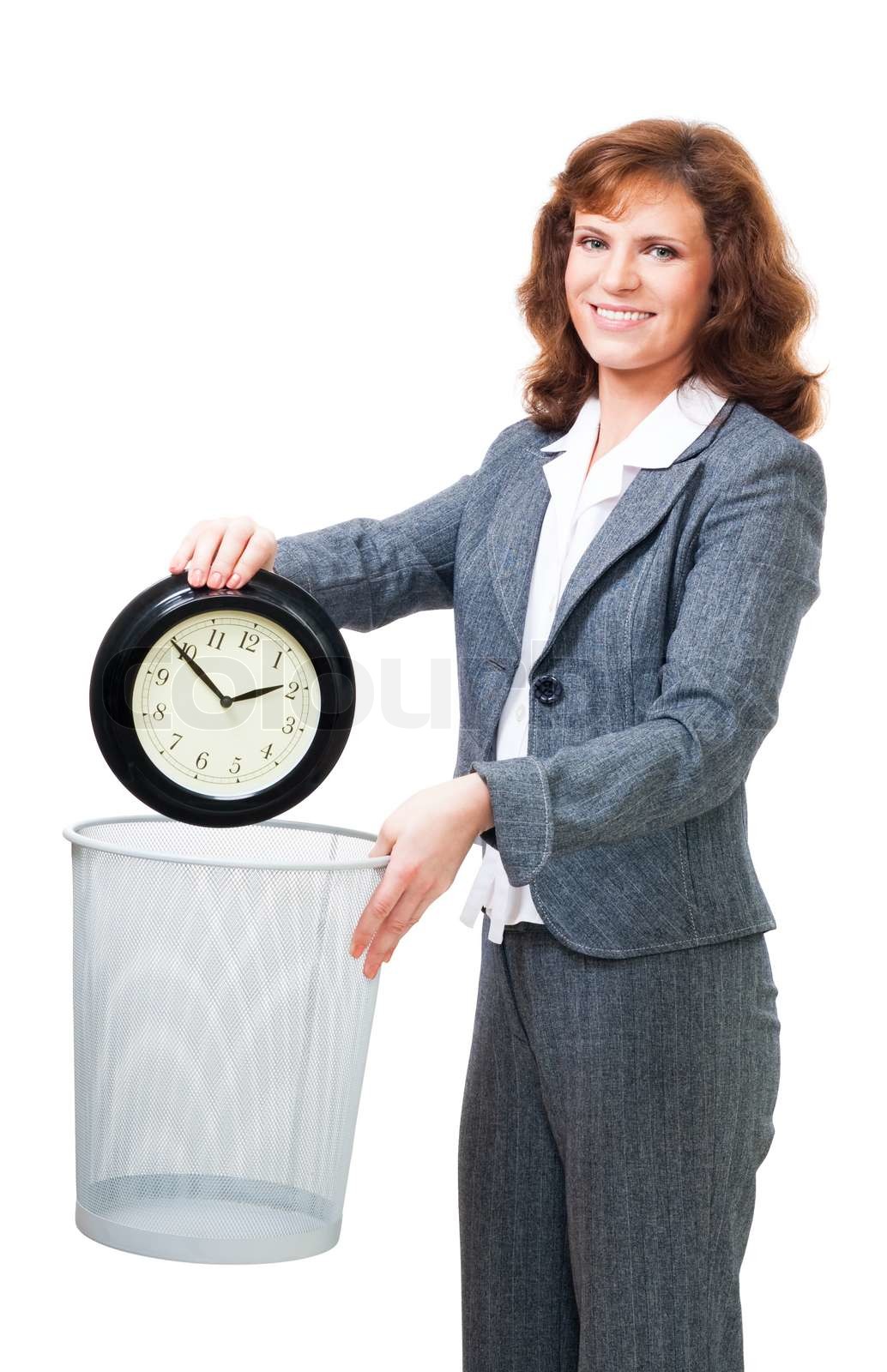Business woman waste time throwing away clock to bin | Stock image ...