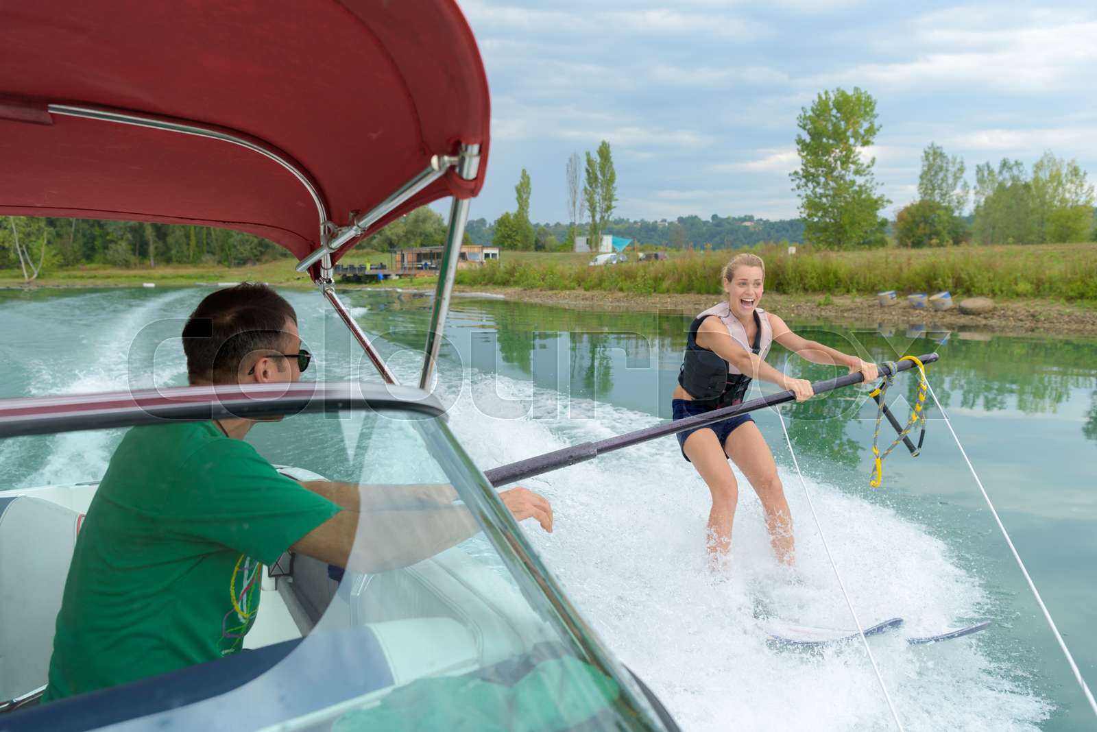 happy woman riding on wakeboarding | Stock image | Colourbox