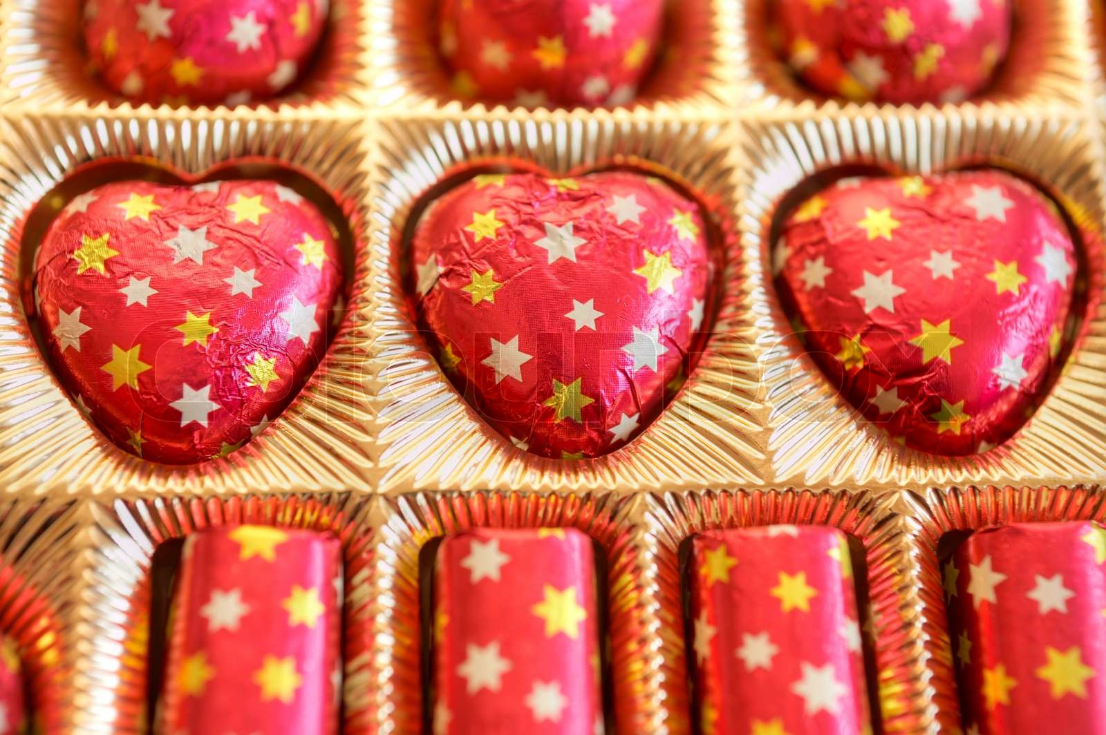 An image of red sweetmeats in golden box | Stock image | Colourbox
