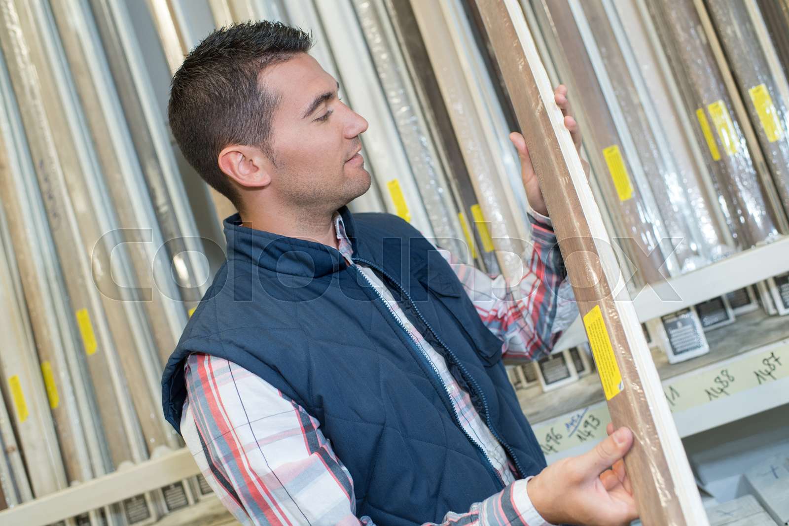 a employee of a hardware store at work | Stock image | Colourbox