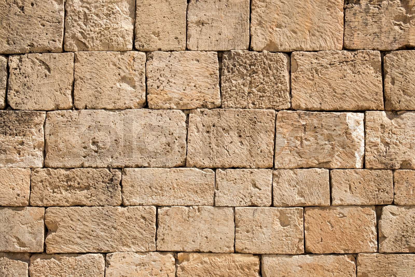 The wall from the ancient blocks of the Nabatean city of Mamshit ...