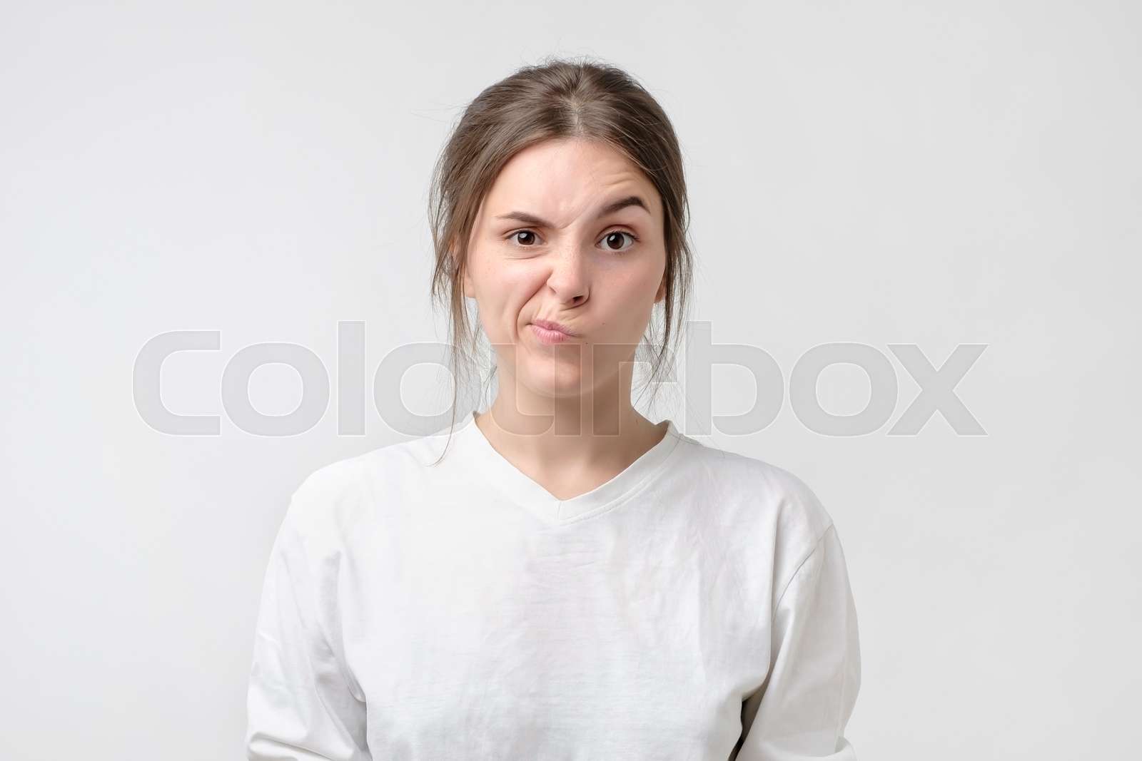 Negative human emotions and feelings. Grumpy young, frowning eyebrows ...