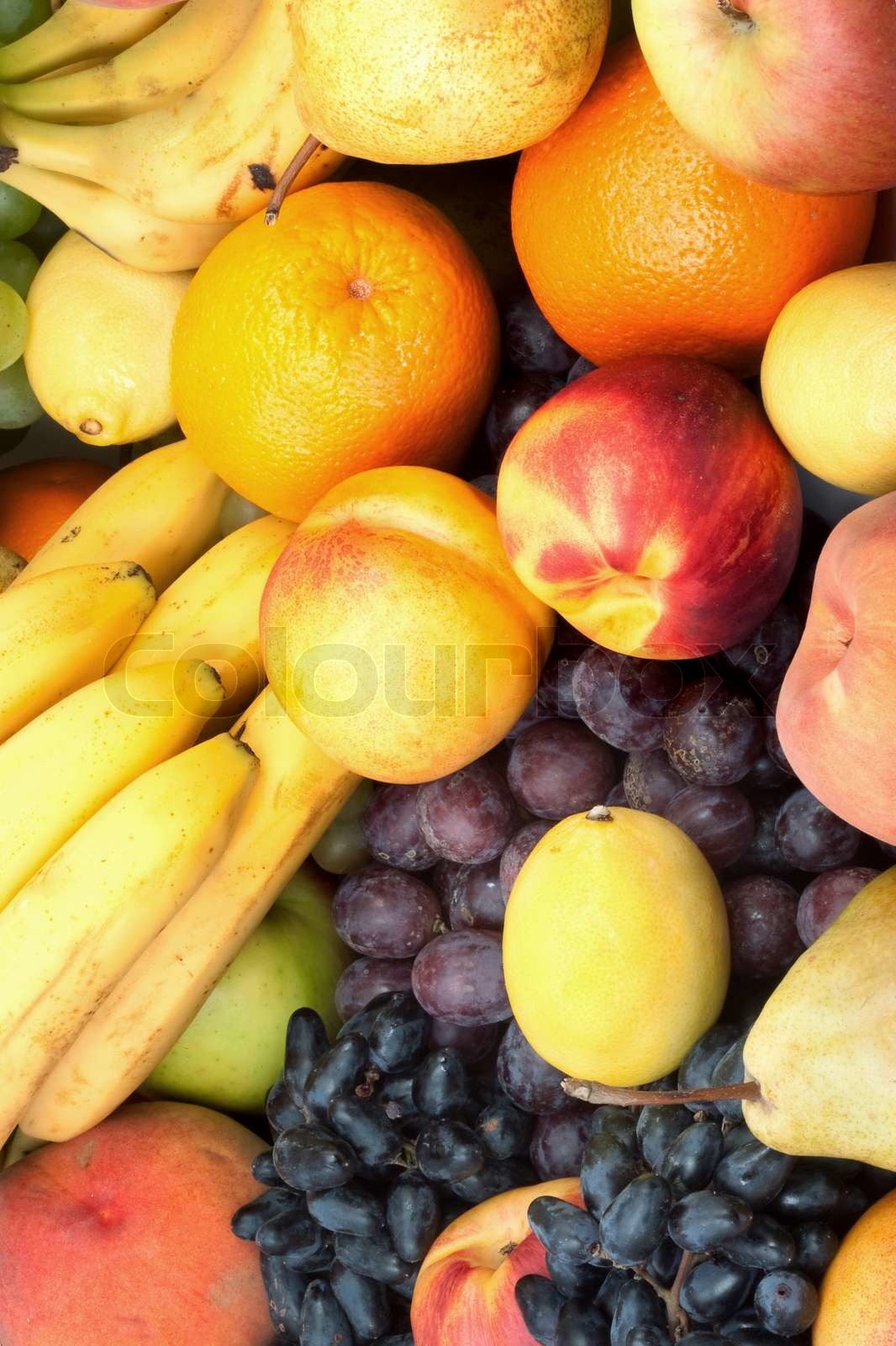 Colorful healthy fresh fruit. Shot in a studio | Stock image | Colourbox