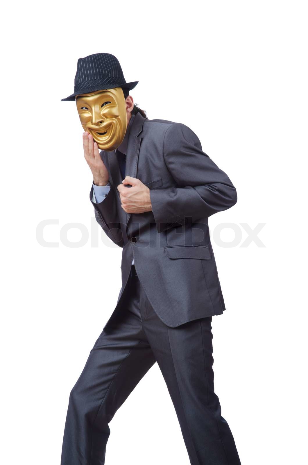 Businessman with mask concealing his identity | Stock image | Colourbox