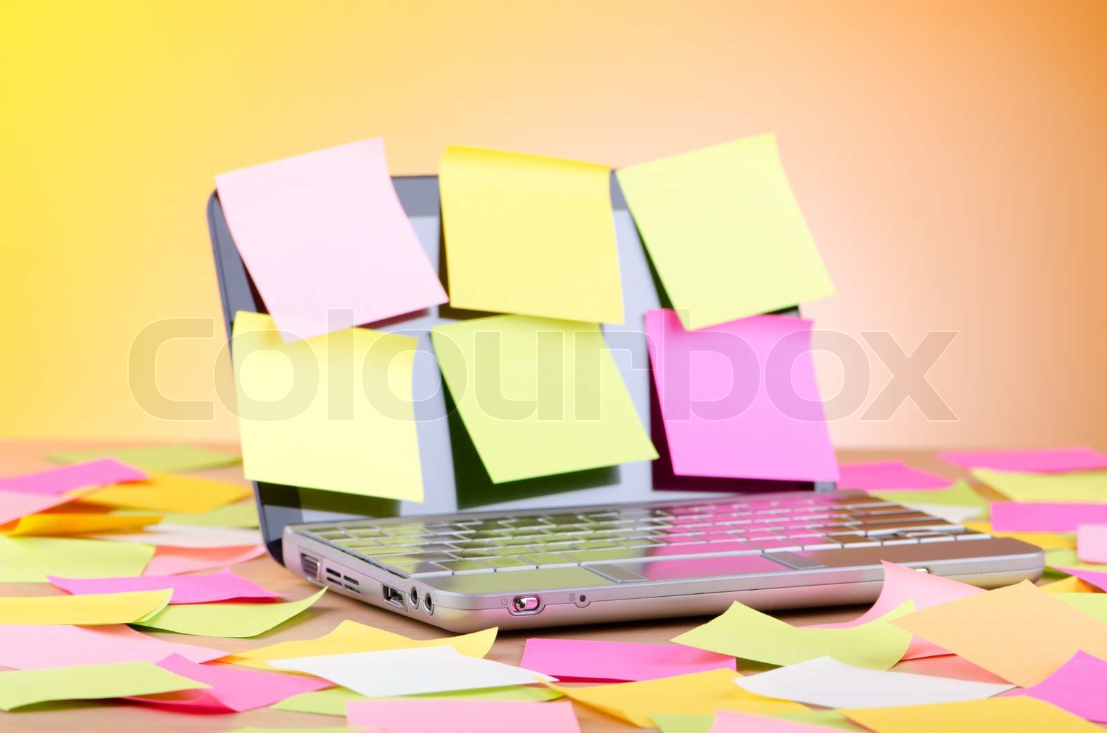 Netbook with reminder notes | Stock image | Colourbox