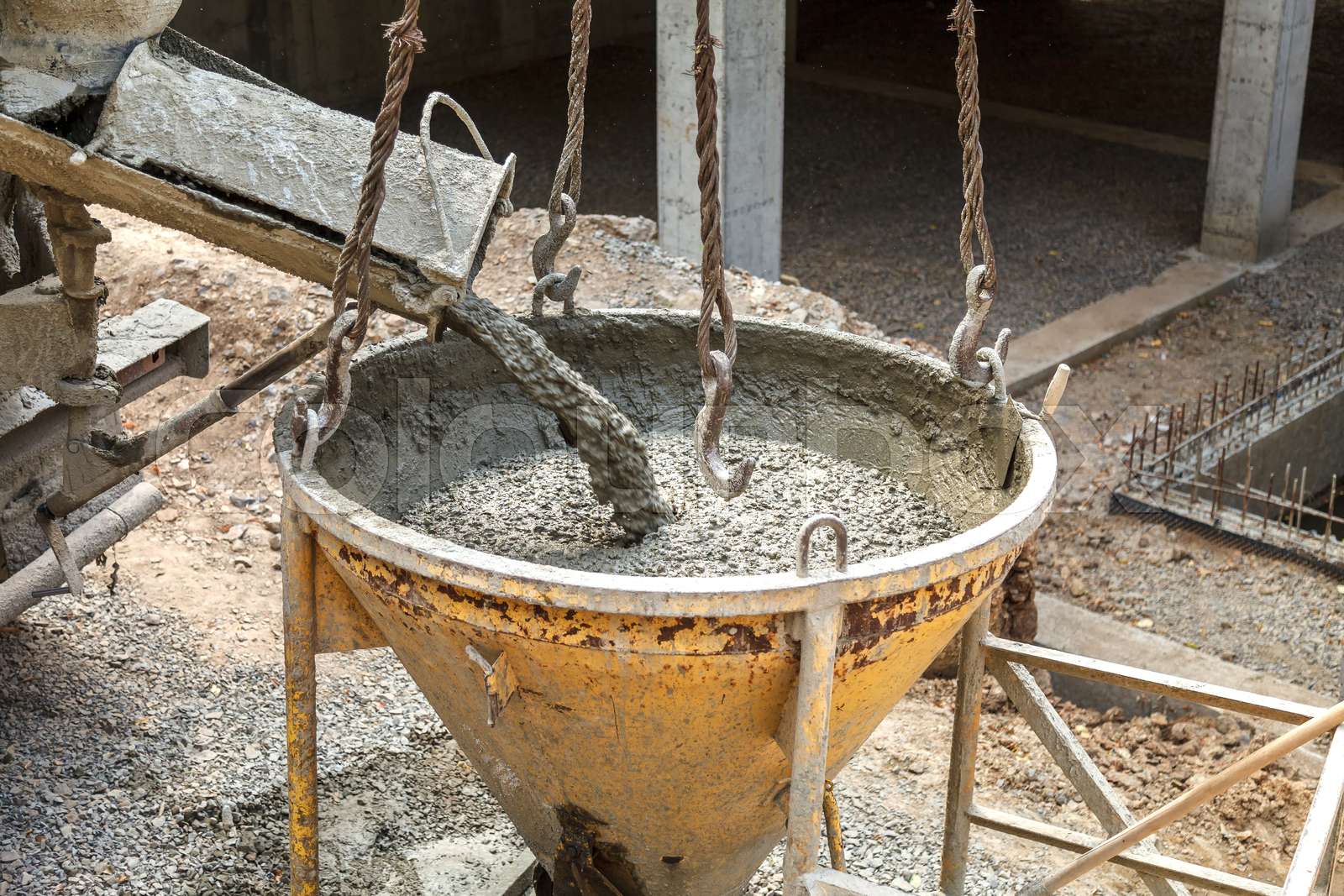 Pouring concrete into the construction of the house | Stock image ...
