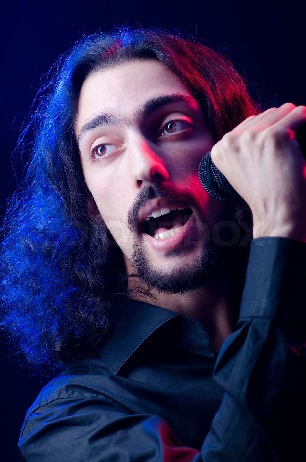 Man singing at the concert | Stock image | Colourbox