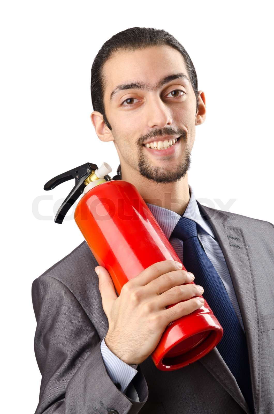 Man with fire extinguisher in firefighting concept | Stock image ...