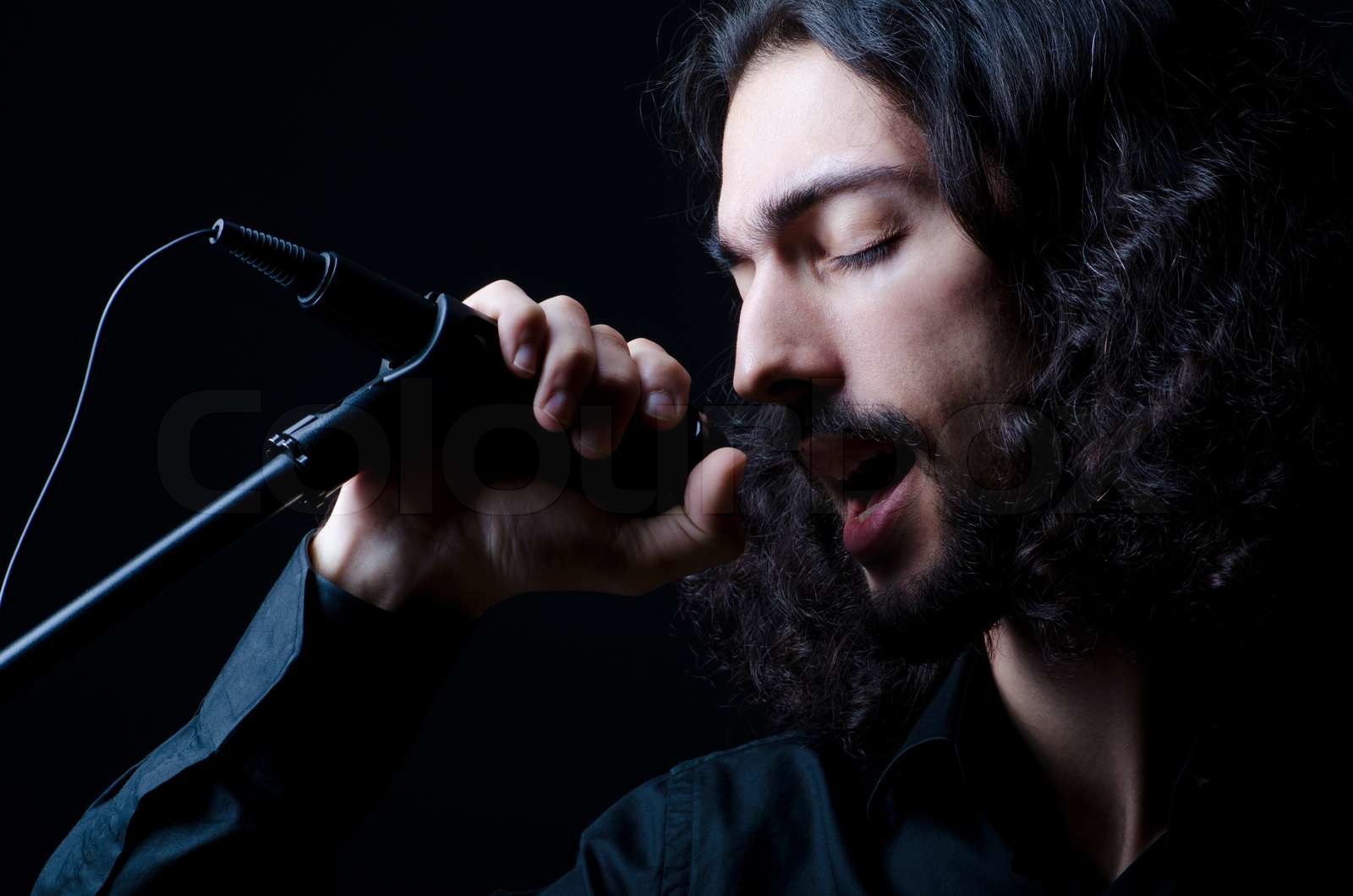 Man singing at the concert | Stock image | Colourbox