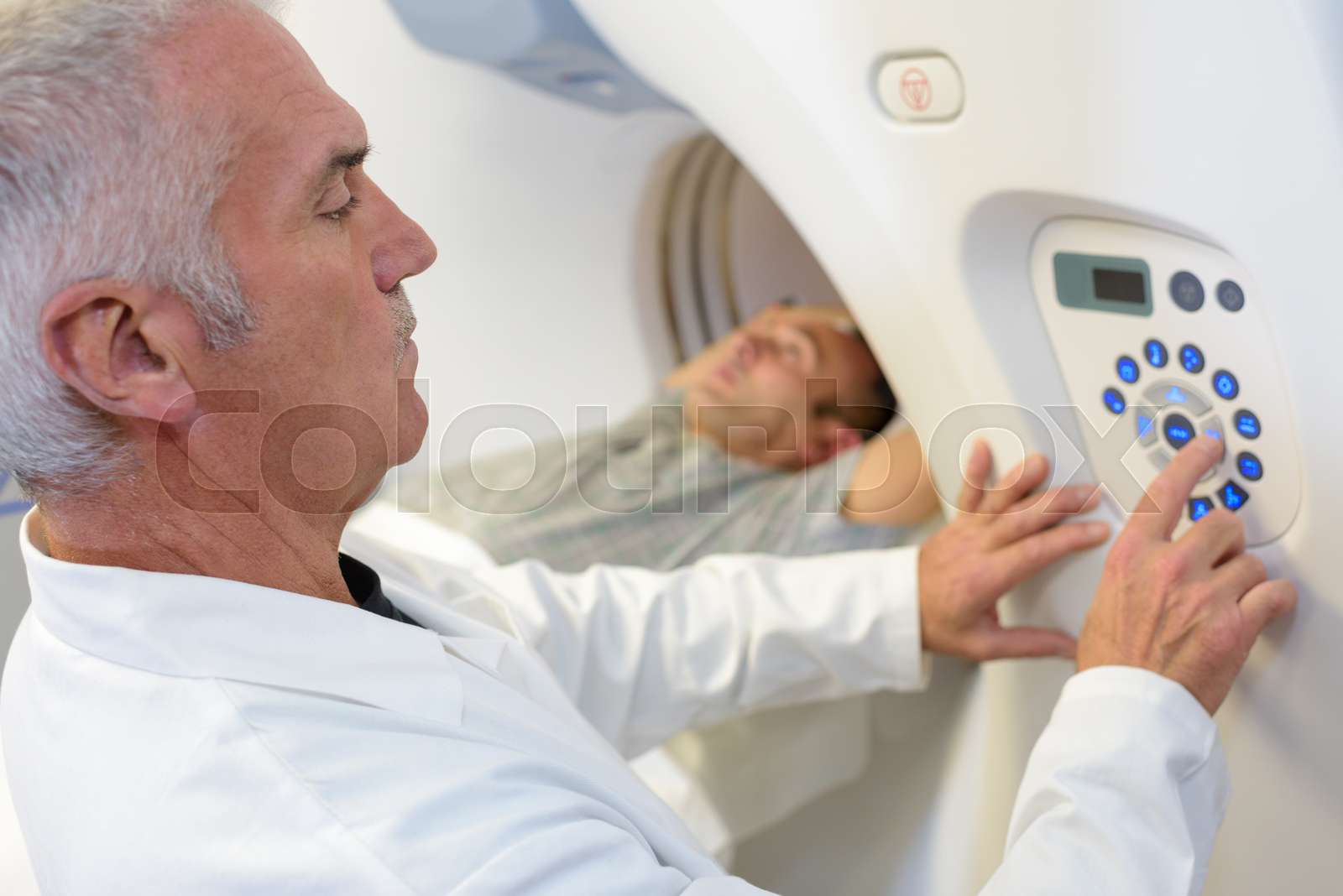 pressing MRI buttons | Stock image | Colourbox