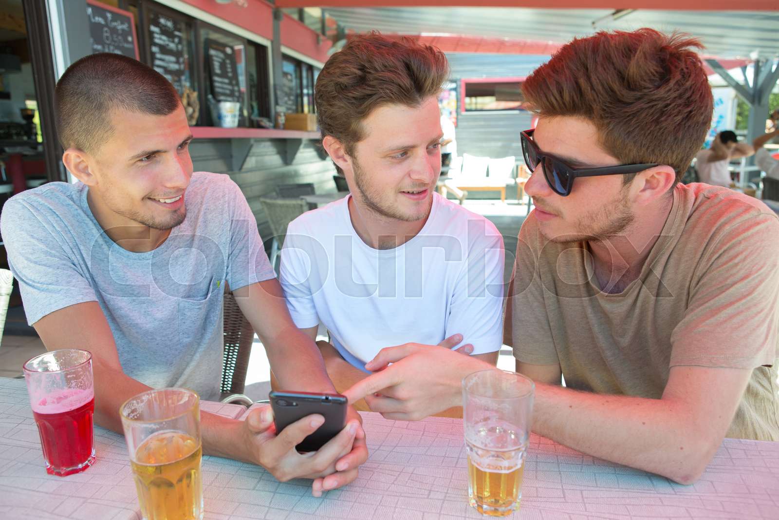 young men socializing | Stock image | Colourbox