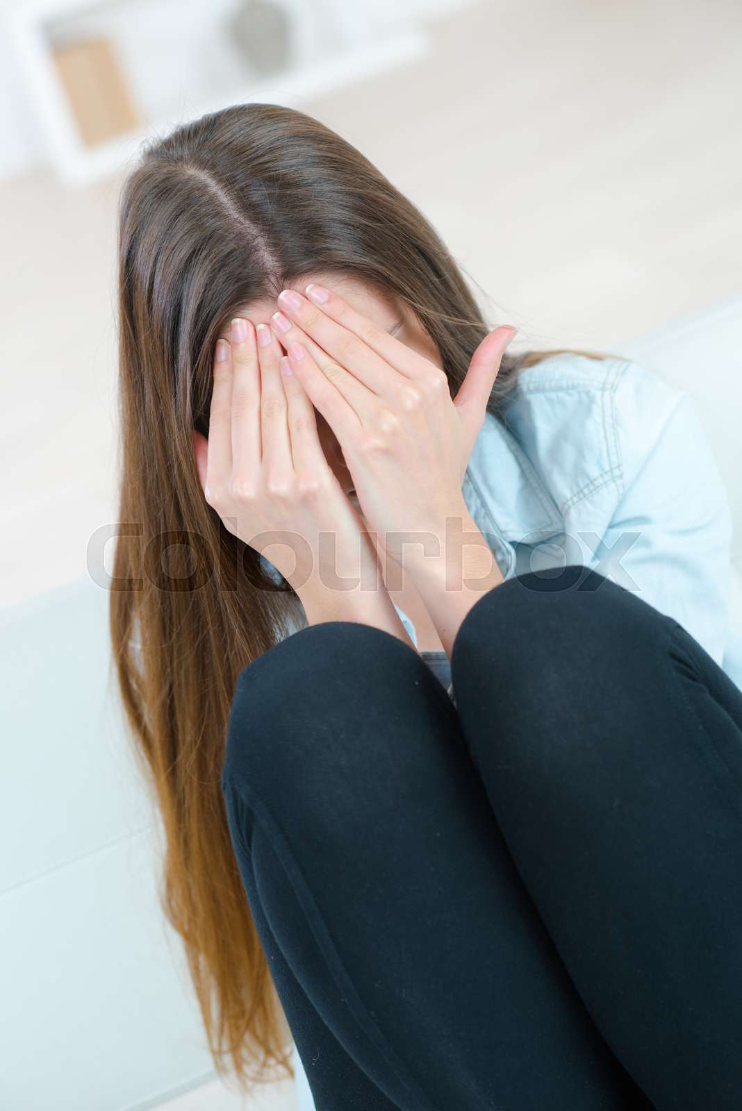 woman cry and hide face | Stock image | Colourbox