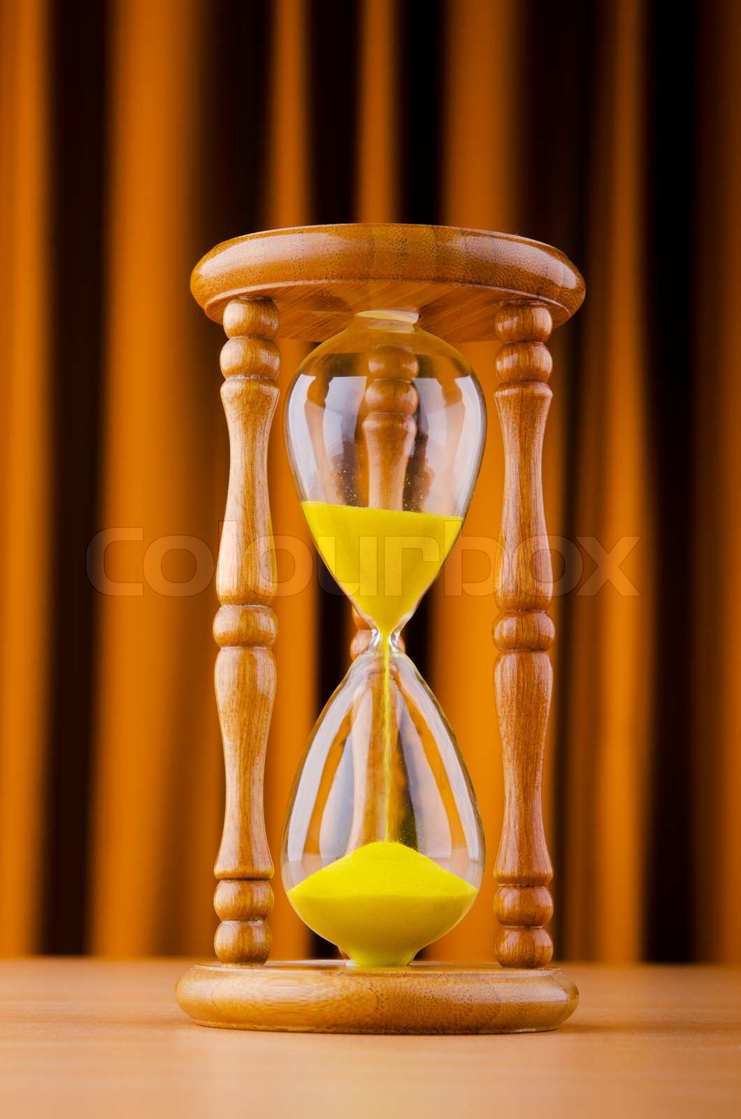 Time concept with hourglass | Stock image | Colourbox