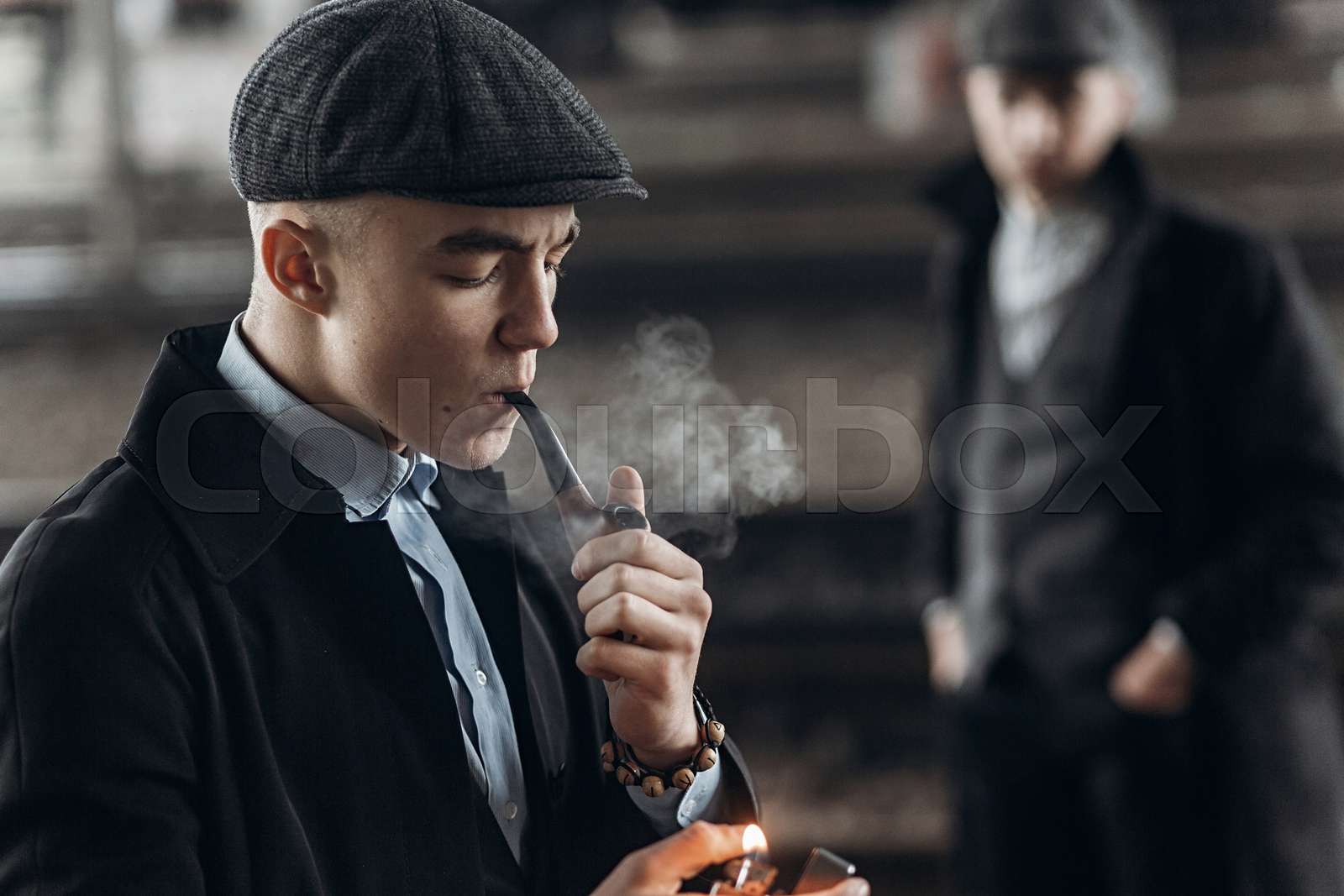 Man Smoking Pipes