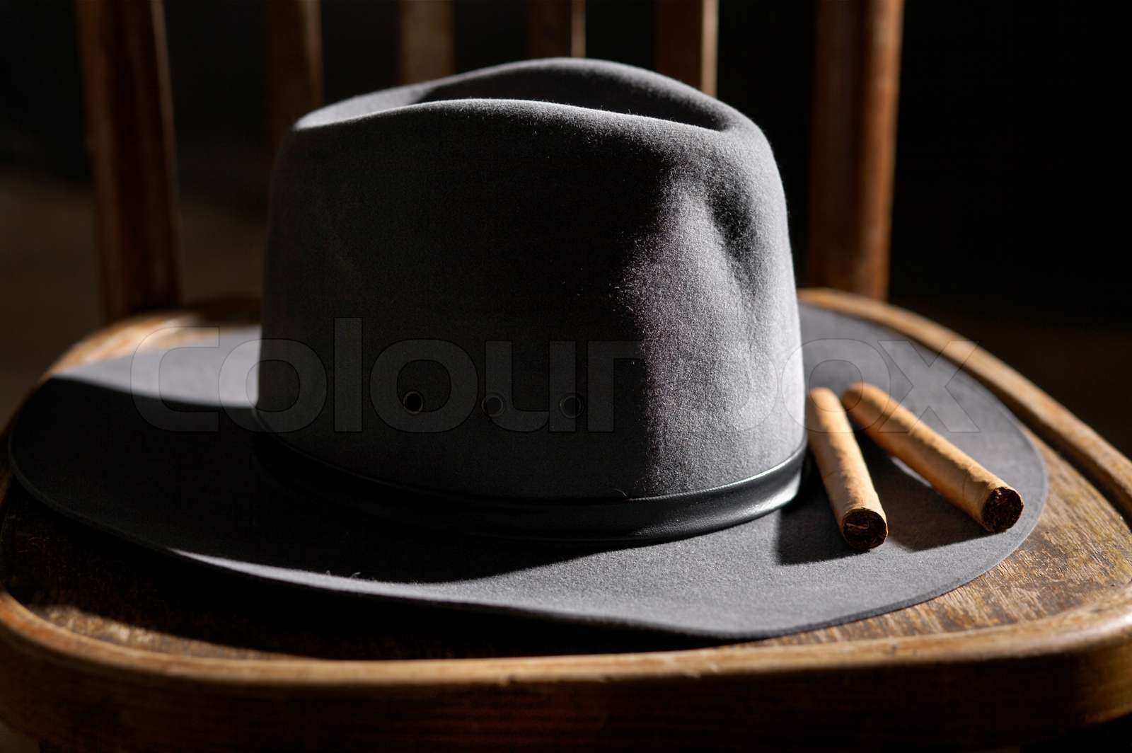 An image of felt hat and cigars | Stock image | Colourbox