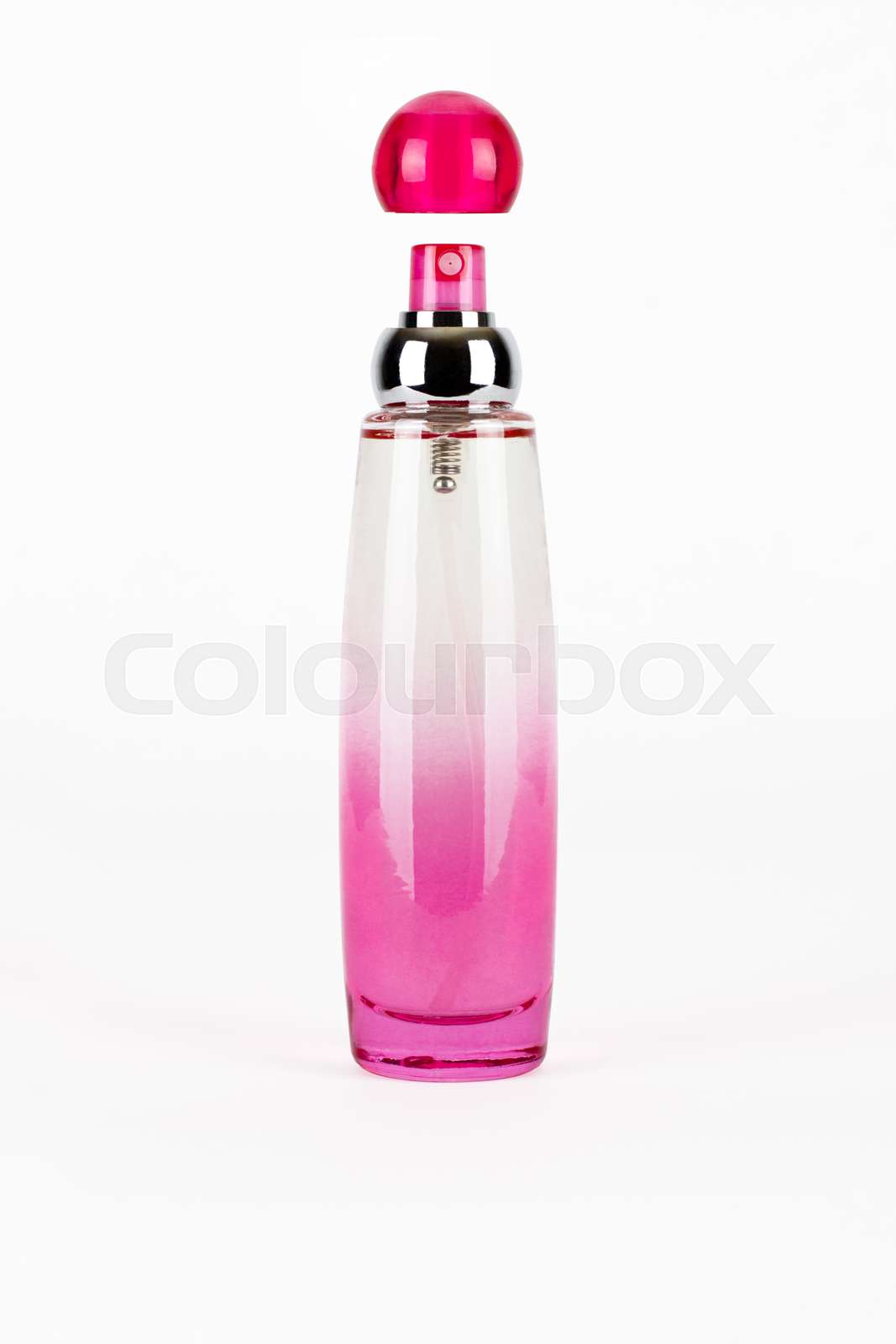 Pink parfume bottle isolated | Stock image | Colourbox