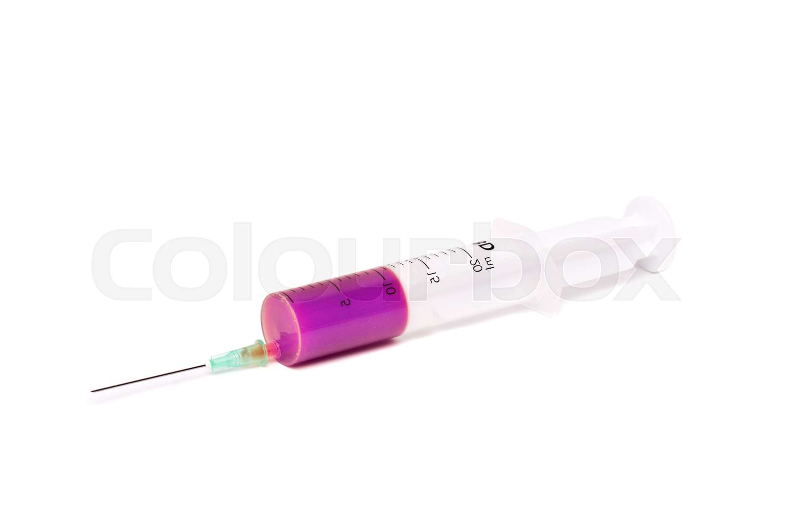 syringe with purple medication | Stock image | Colourbox