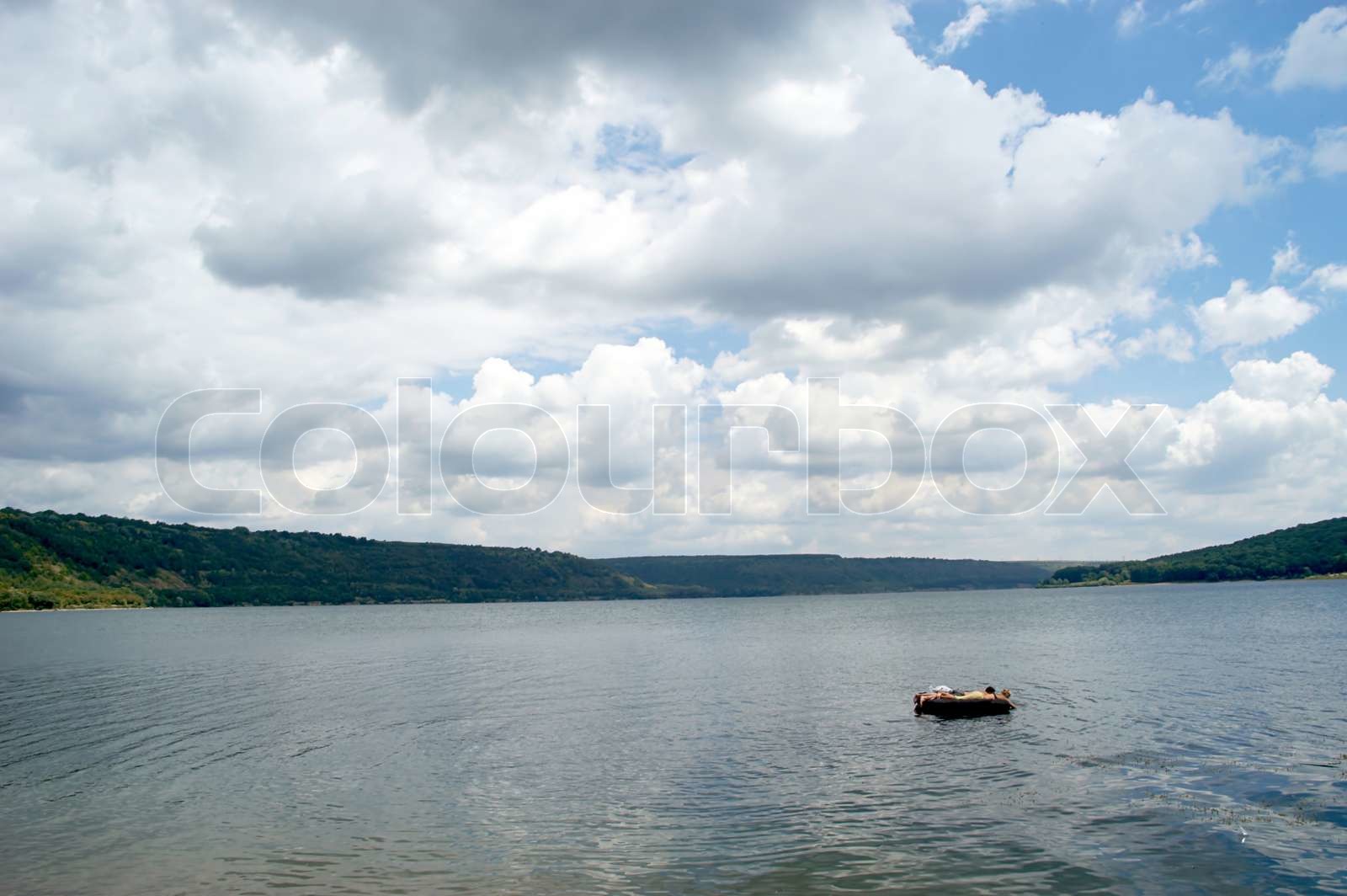 A river with a boat | Stock image | Colourbox