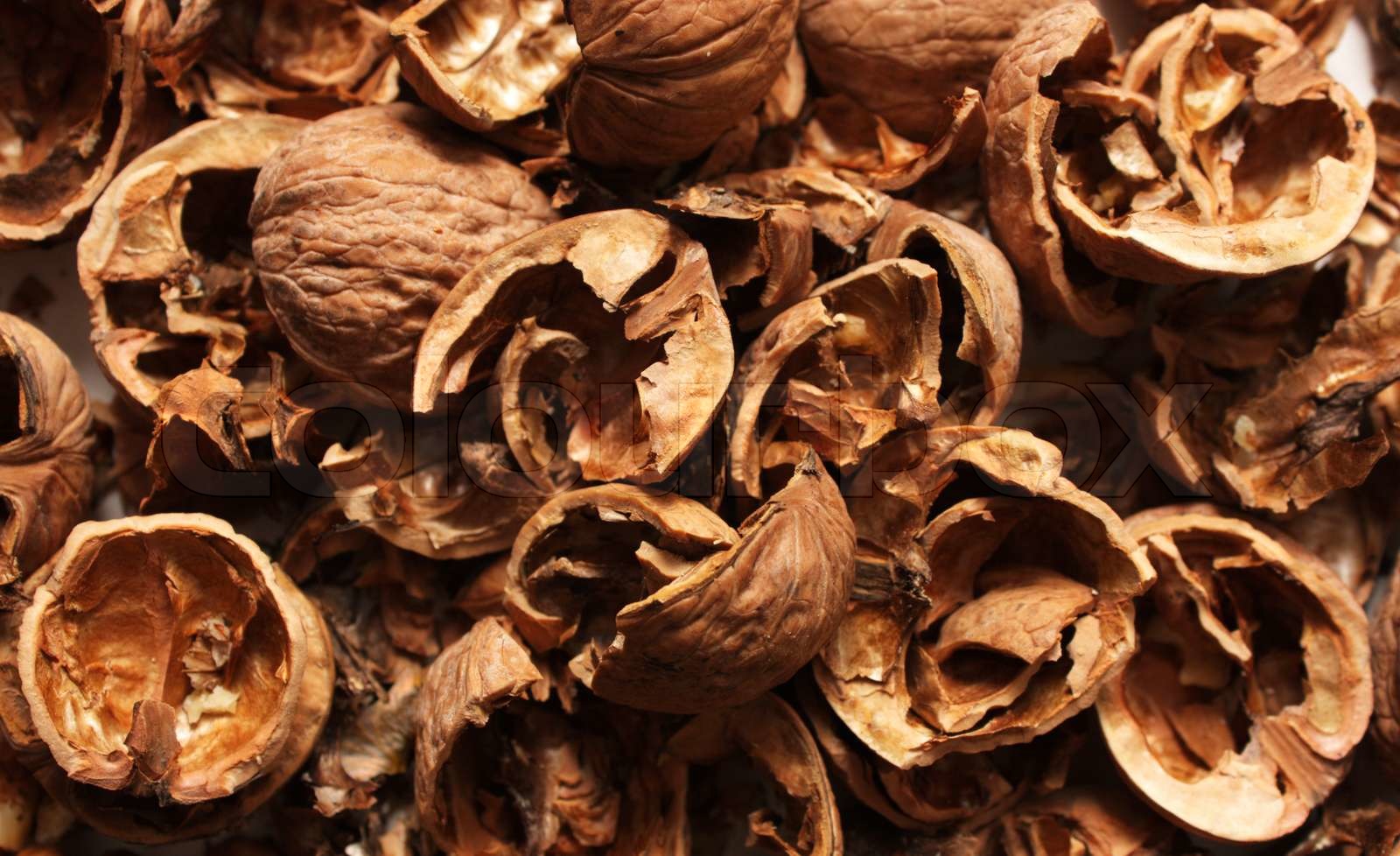 Broken and peeled nuts with shell | Stock image | Colourbox