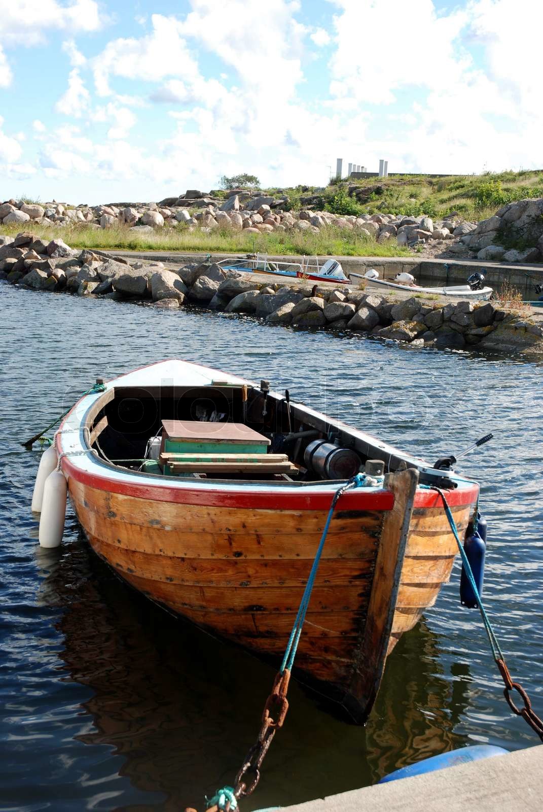 Empty Wooden Boat by the sunny Coast | Stock image | Colourbox