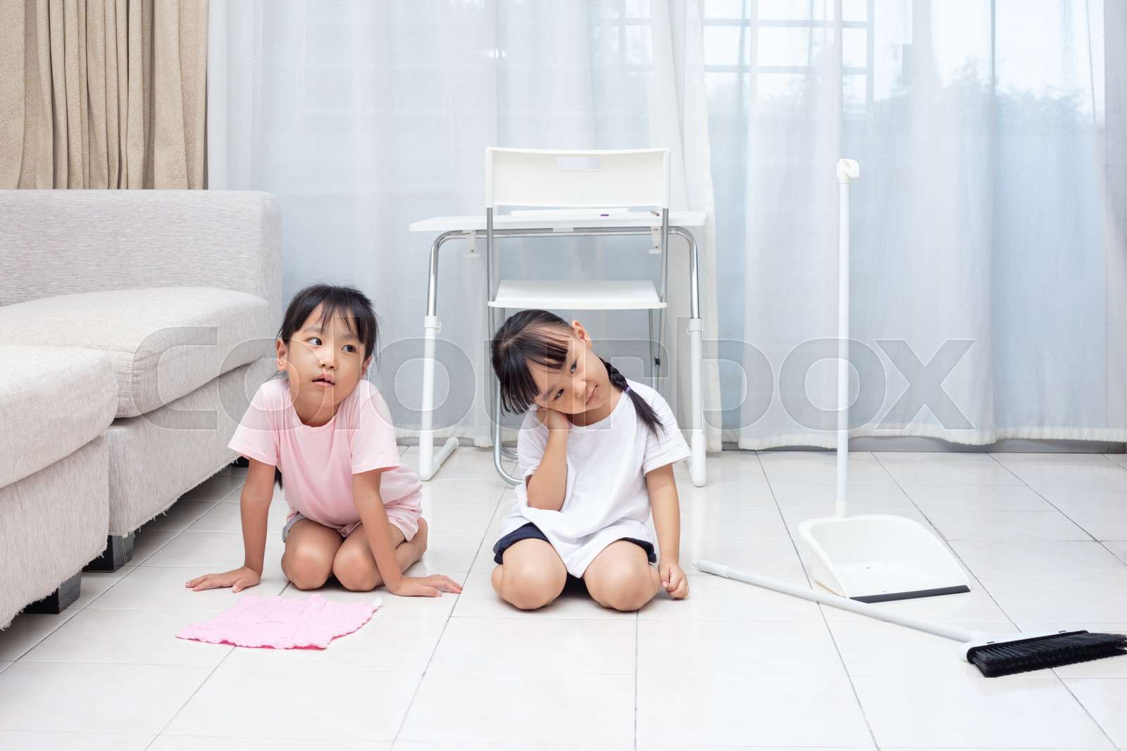 Asian Chinese little sisters helping doing cleaning | Stock image ...
