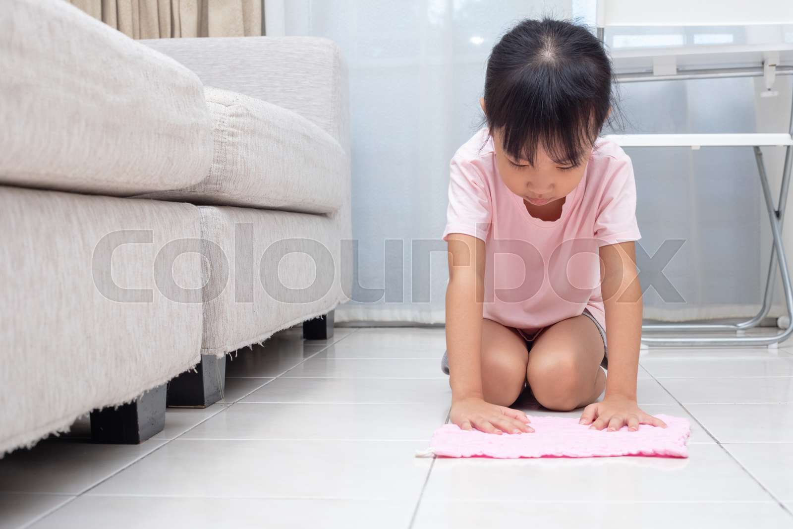 Asian Chinese little girl helping doing cleaning with rag | Stock image ...