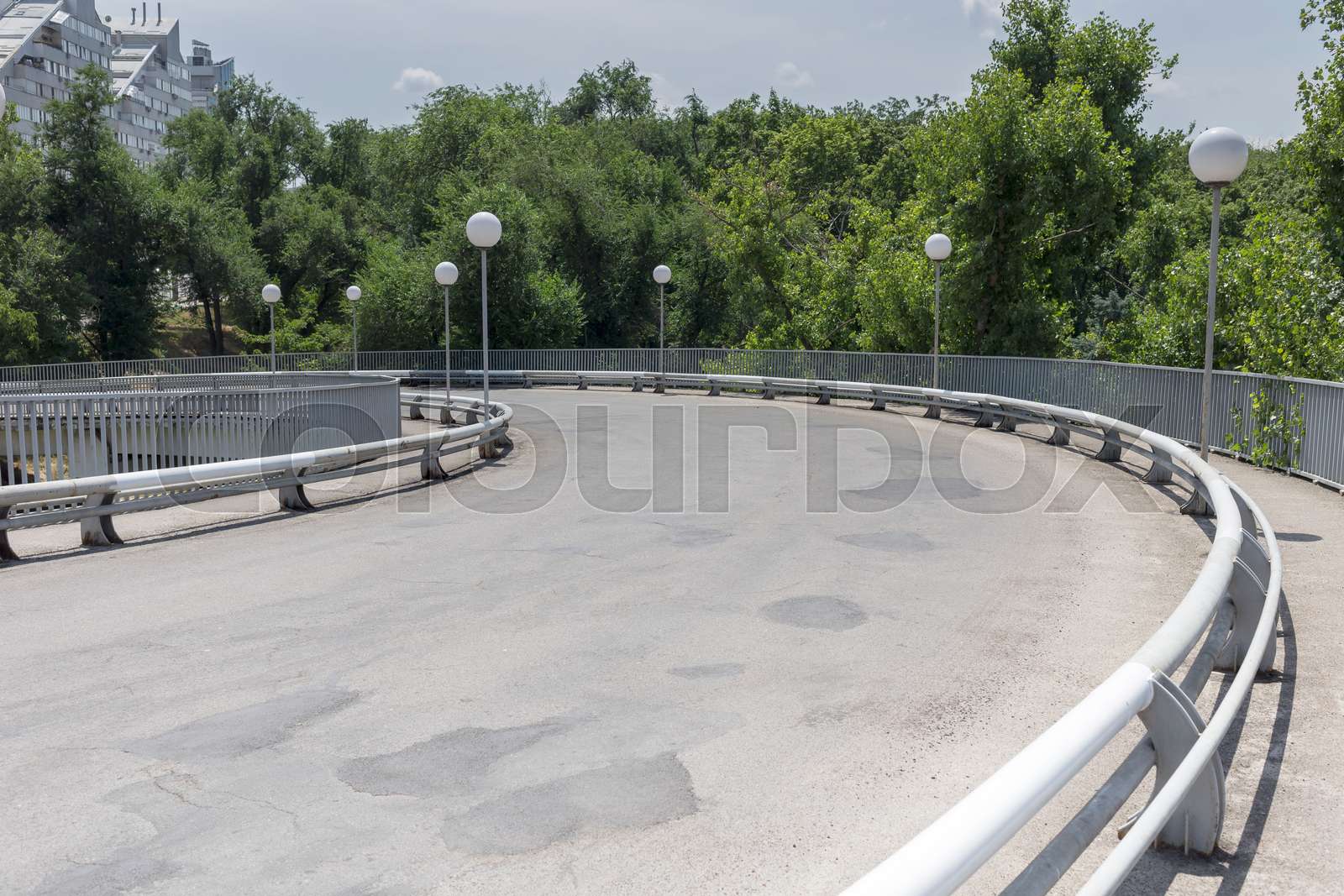 Bend of a road in the city. | Stock image | Colourbox